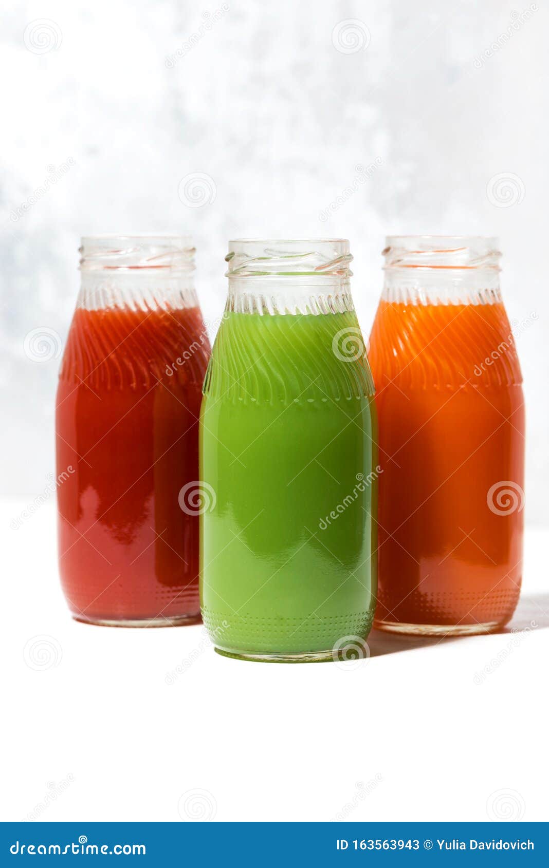 Colorful Vegetable Juices in Bottles, Vertical Closeup Stock Image ...