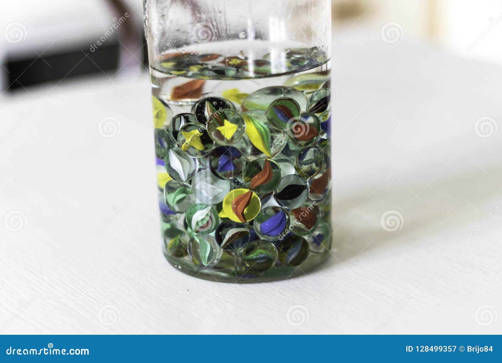 Colorful Vintage Glass Marbles in Water in Glass Jar Stock Image ... Colorful Vintage Glass Marbles in Water in Glass Jar Stock Image ...