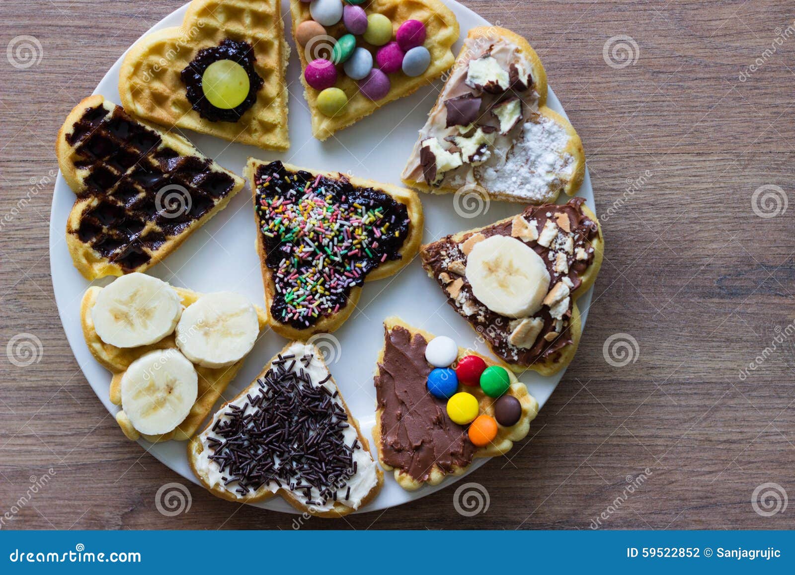Colorful waffles on plate stock photo. Image of eating - 59522852