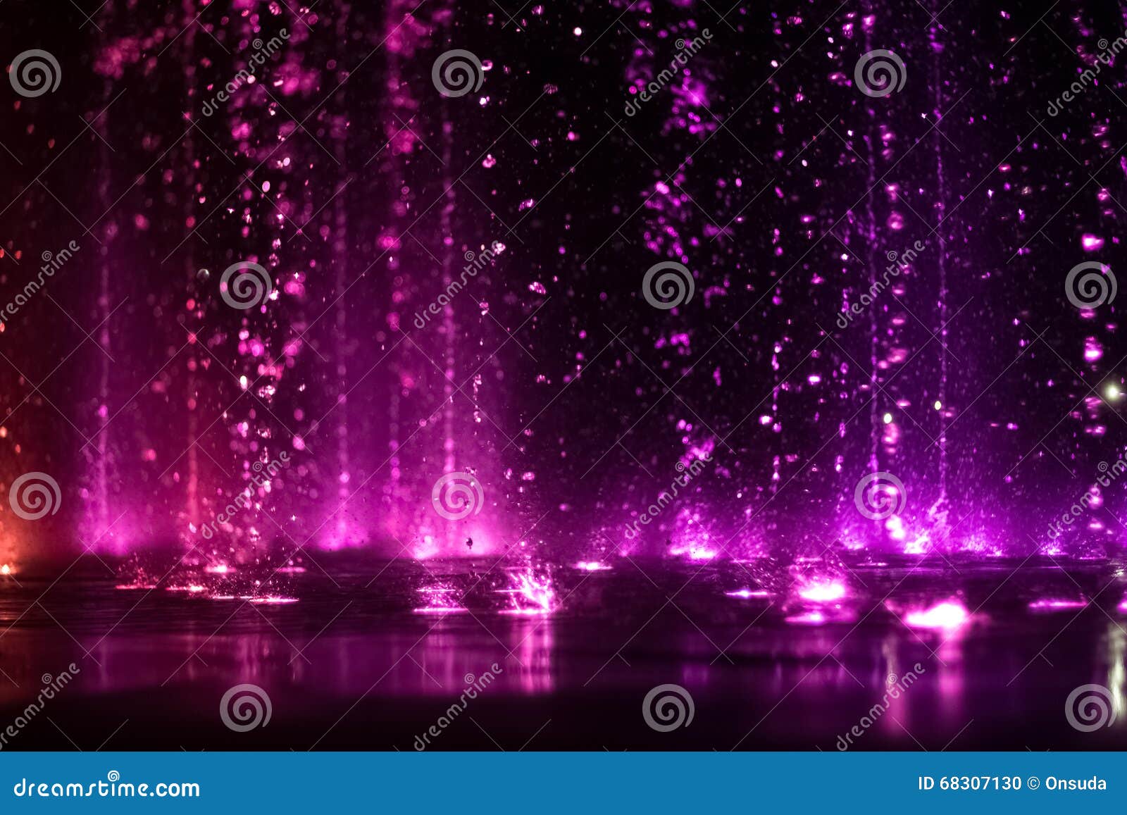 Colorful Water Fountain on Black Background Stock Photo - Image of ...