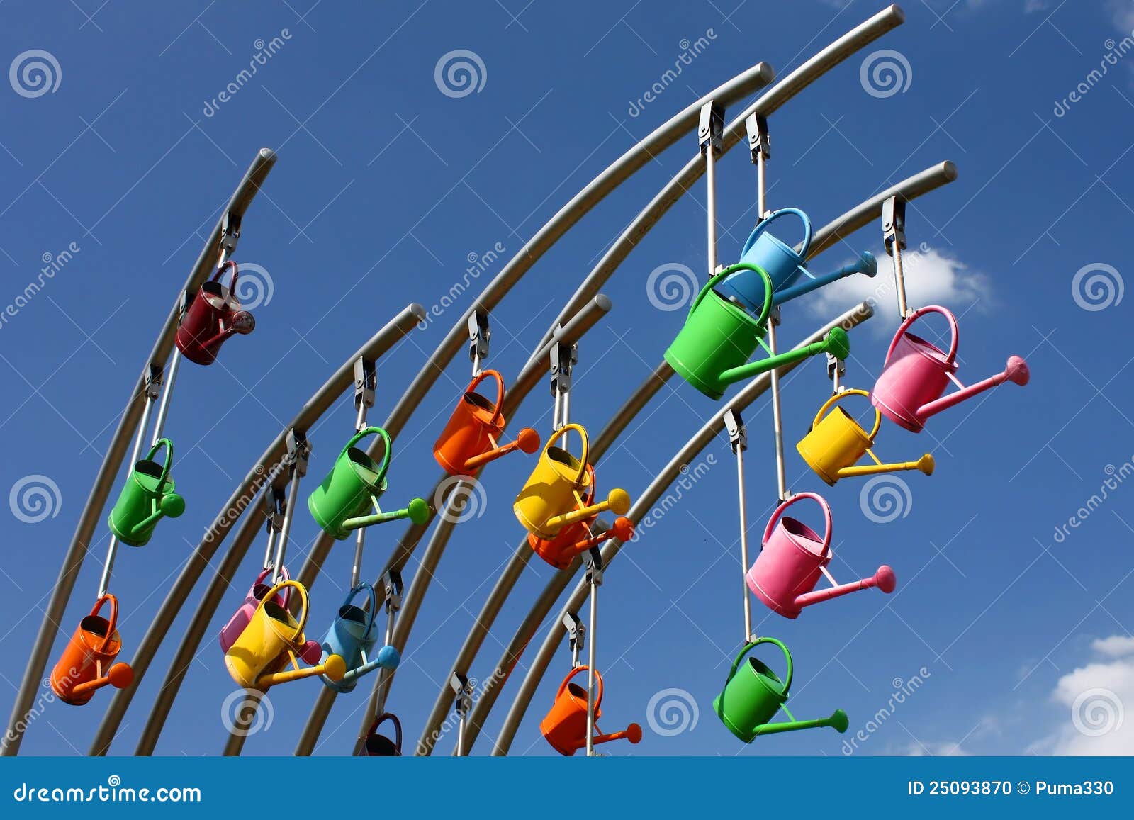Colorful watering cans stock photo. Image of play, flower - 25093870