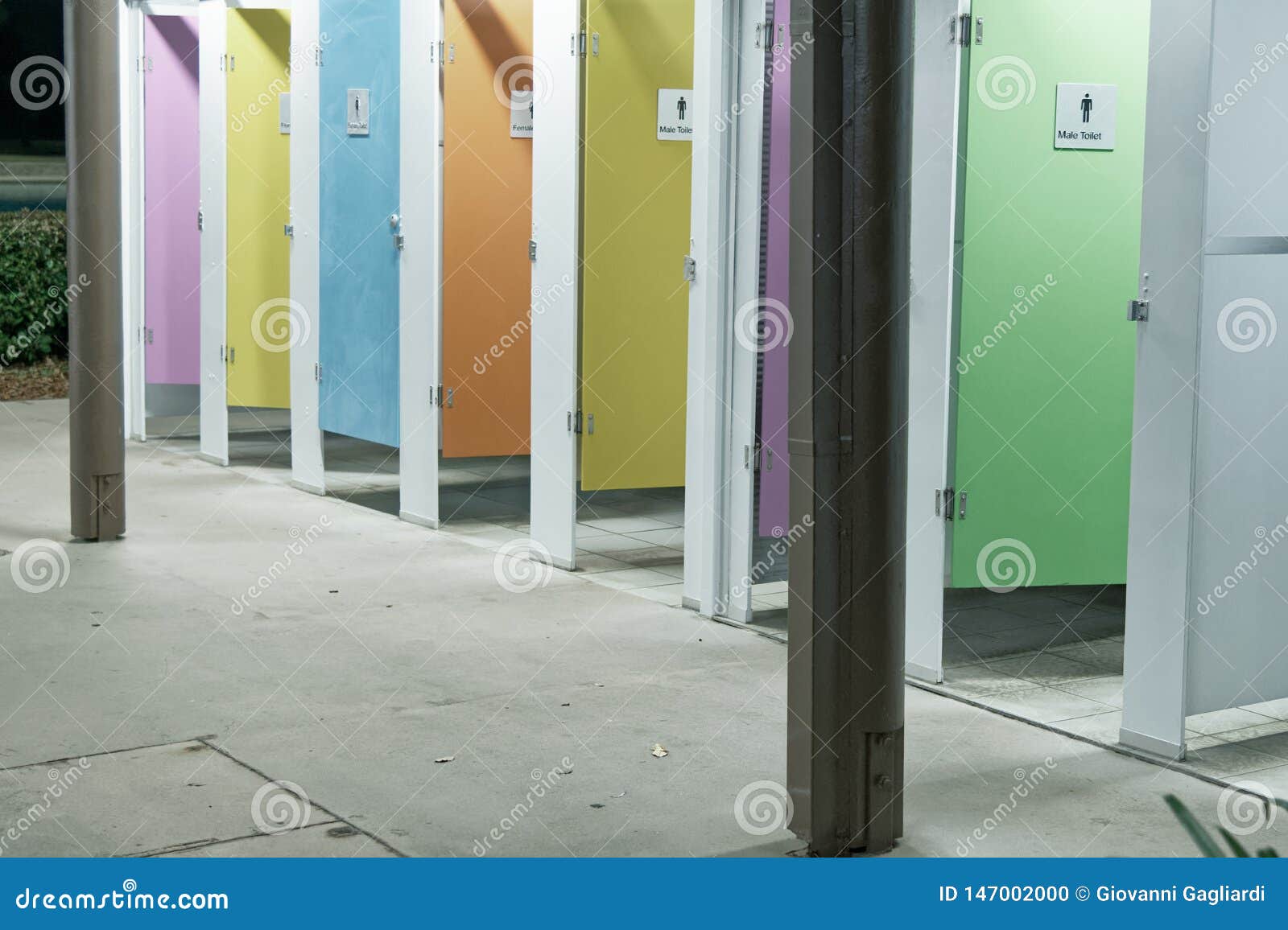 Colorful WC Cabins at Night in a City Square Stock Photo - Image of ...