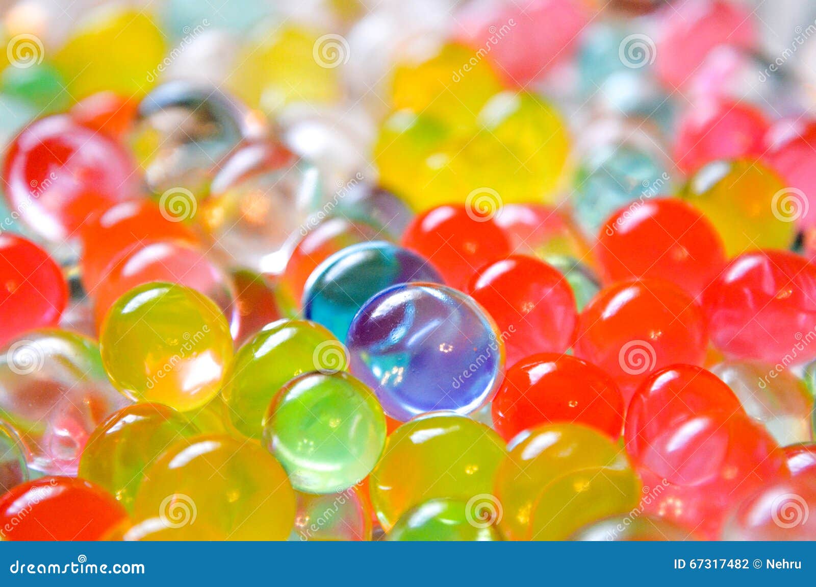 Colorful wet plastic balls stock photo. Image of card - 67317482