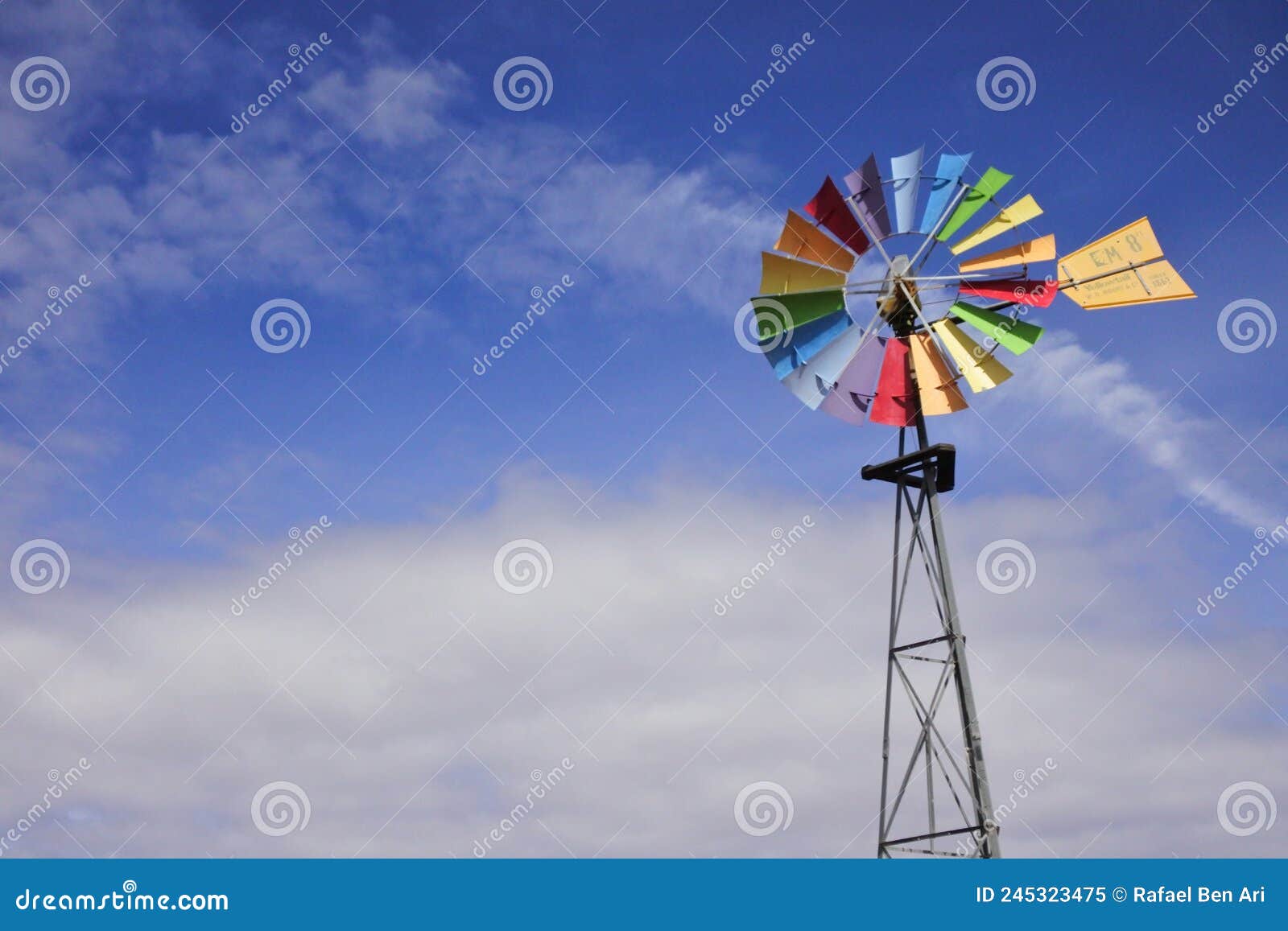Colorful Wind Mill Isolated on Blue Sky Stock Image - Image of pump ...