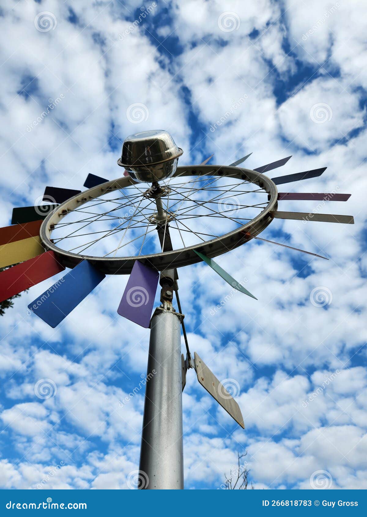 Colorful Wind Vane Made of a Bike Wheel Stock Image - Image of aviation, vane: 266818783