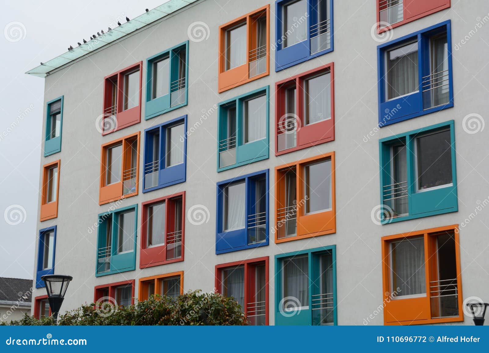 Colorful Windows Frame a Facade Stock Photo - Image of apartment ...