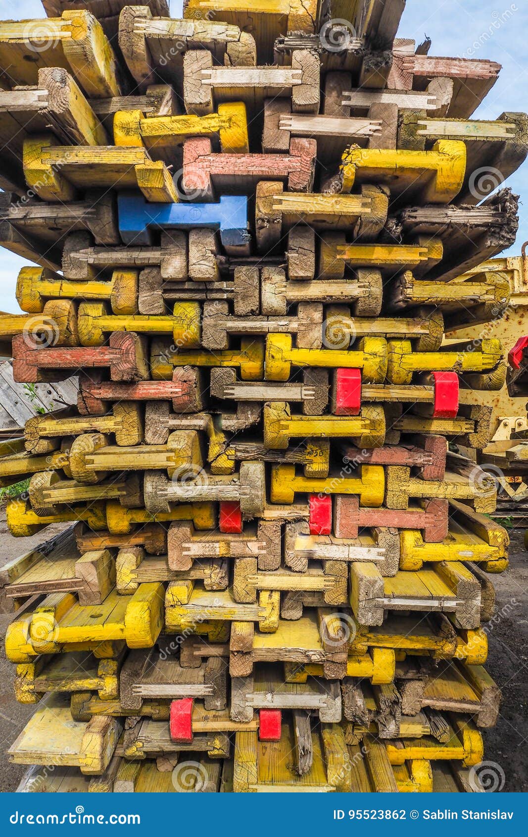 Colorful Wooden Parts of Scaffolding from the Folded Stack in the ...