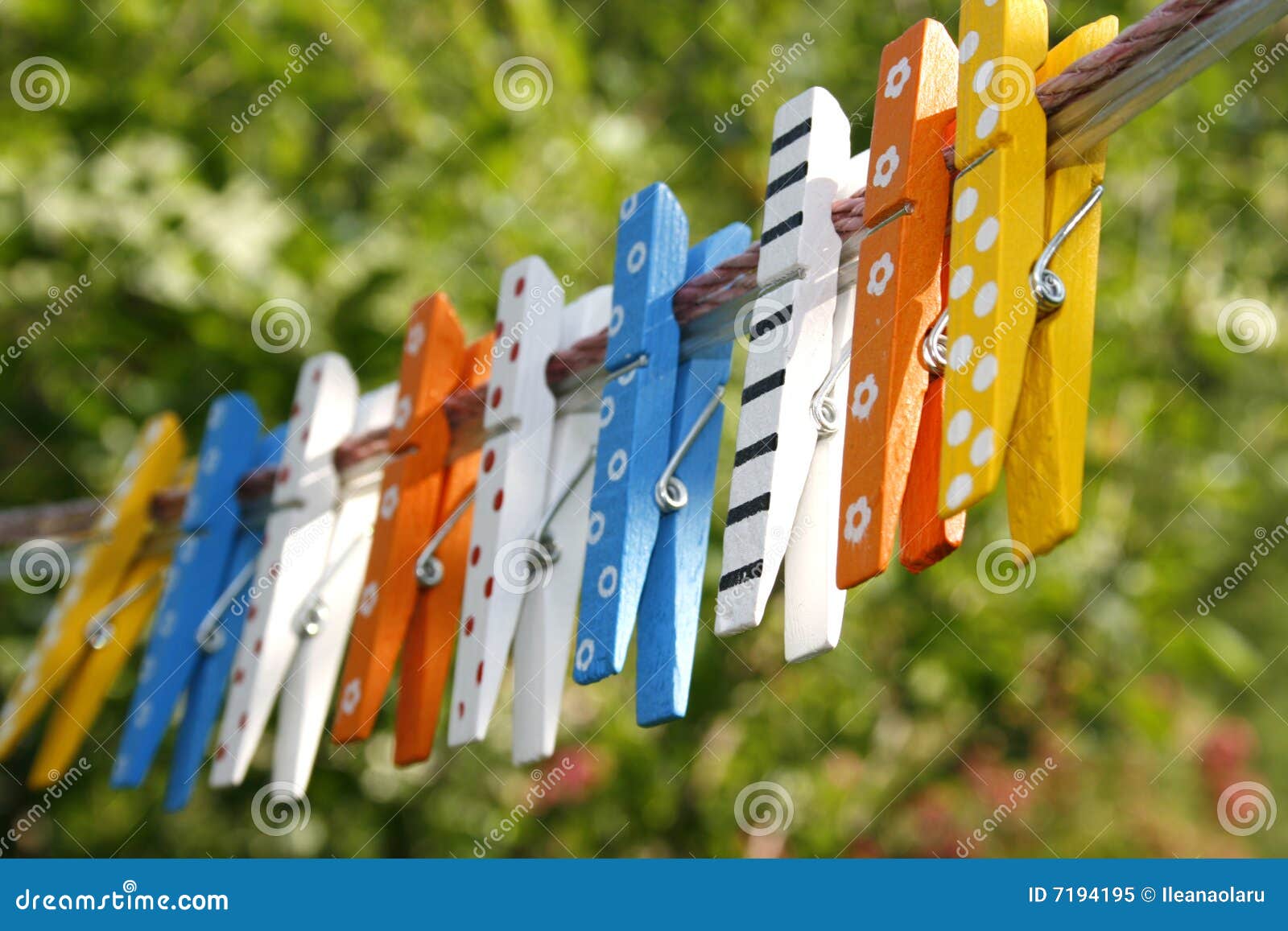 Colorful wooden pegs stock image. Image of white, sunny - 7194195
