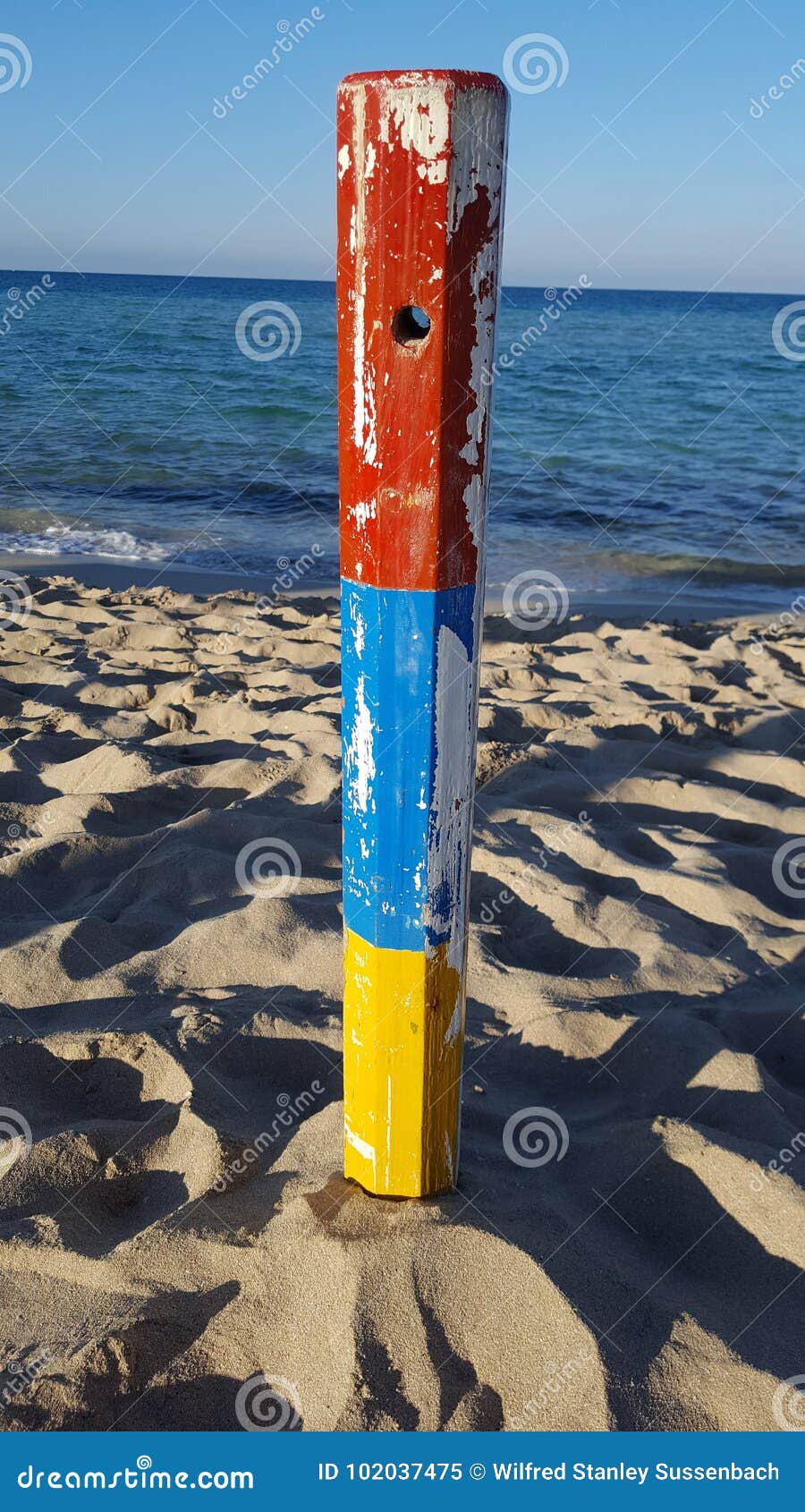Colorful pole on beach stock image. Image of wood, wooden - 102037475