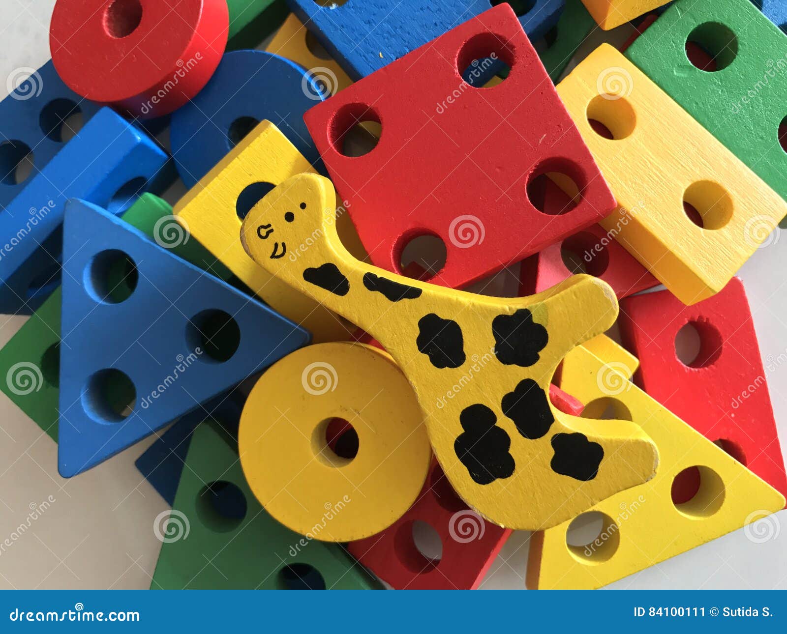 Colorful wooden toy stock image. Image of triangle, pattern - 84100111