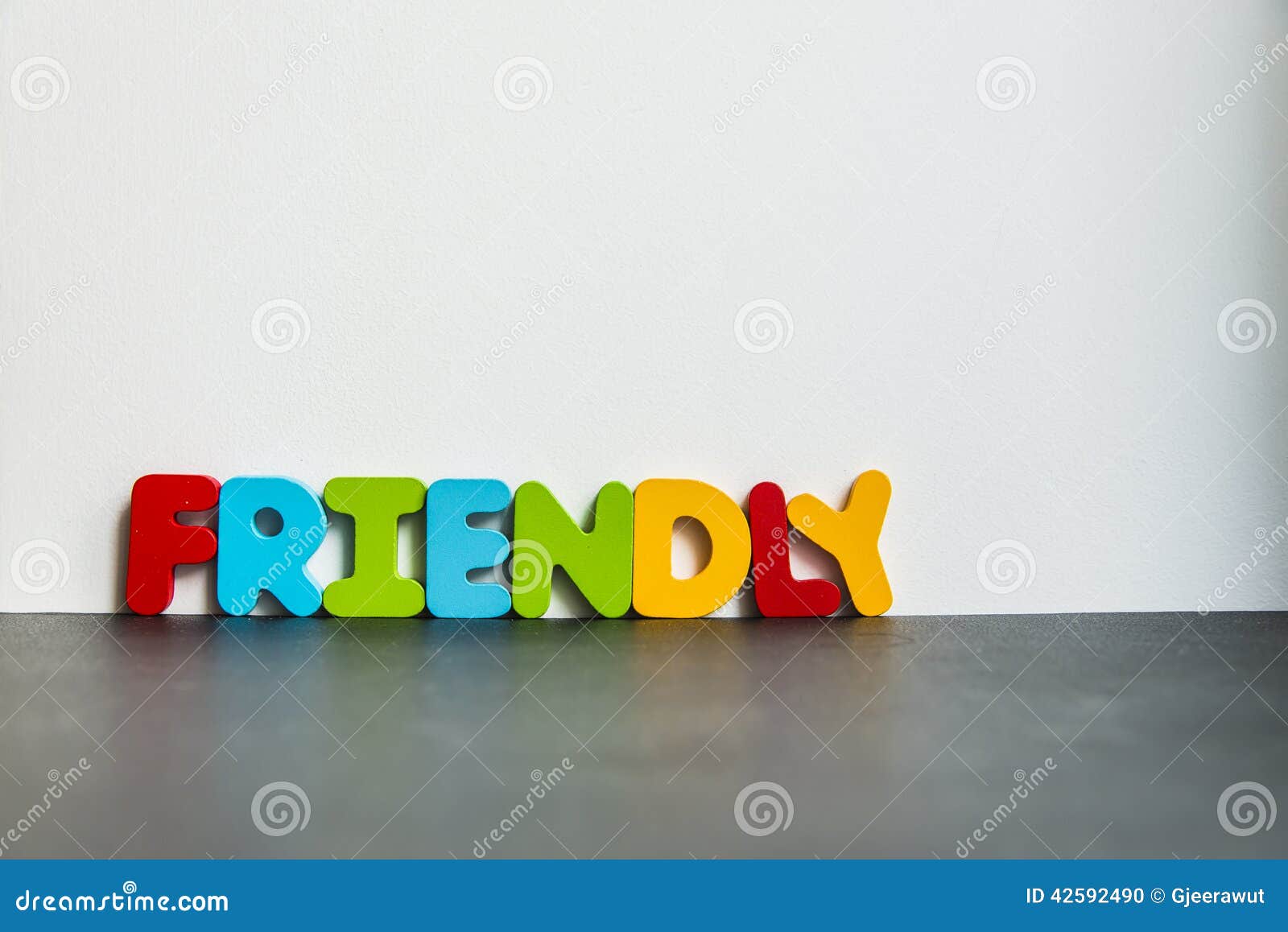 Colorful Wooden Word Friendly with White Background1 Stock Photo ...