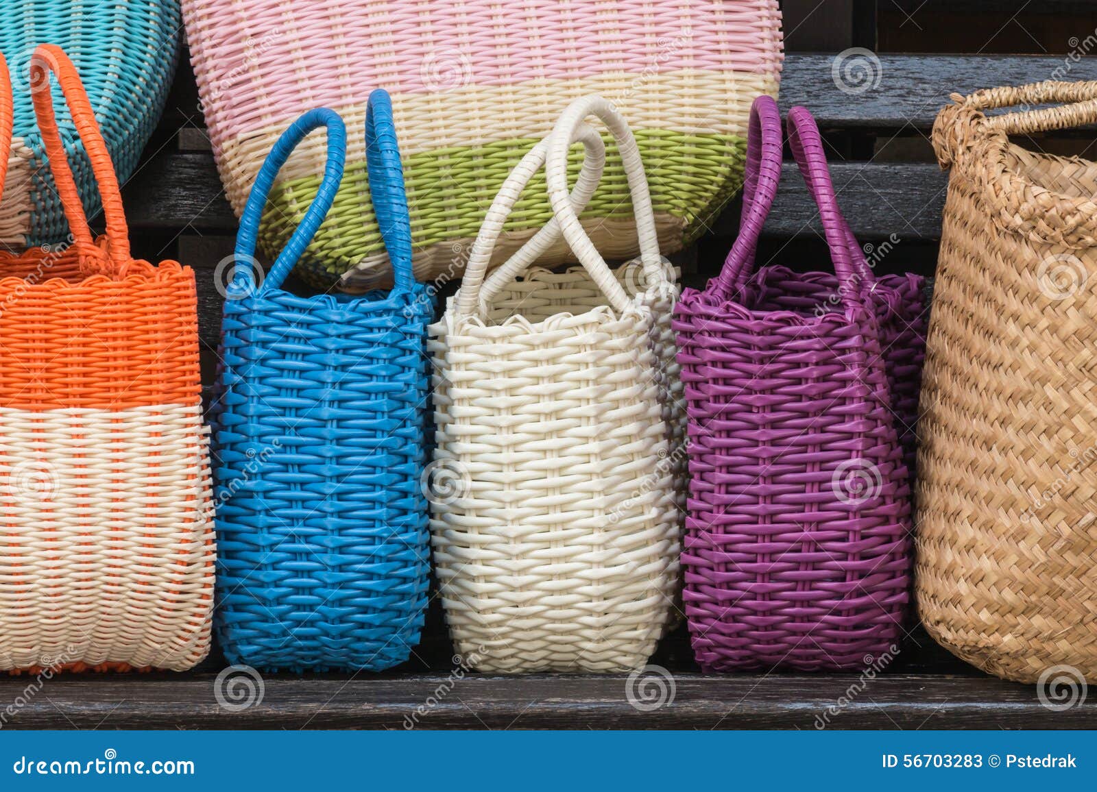 Colorful woven handbags stock image. Image of basket - 56703283