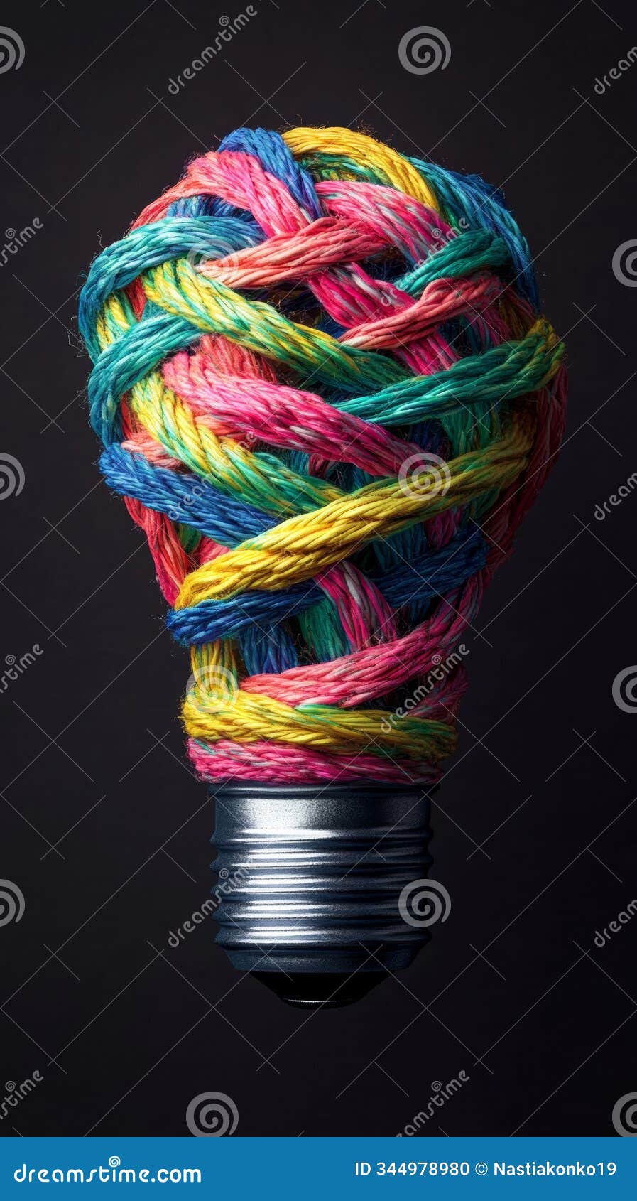 Colorful Yarn-wrapped Light Bulb on Dark Background, Creativity Concept ...