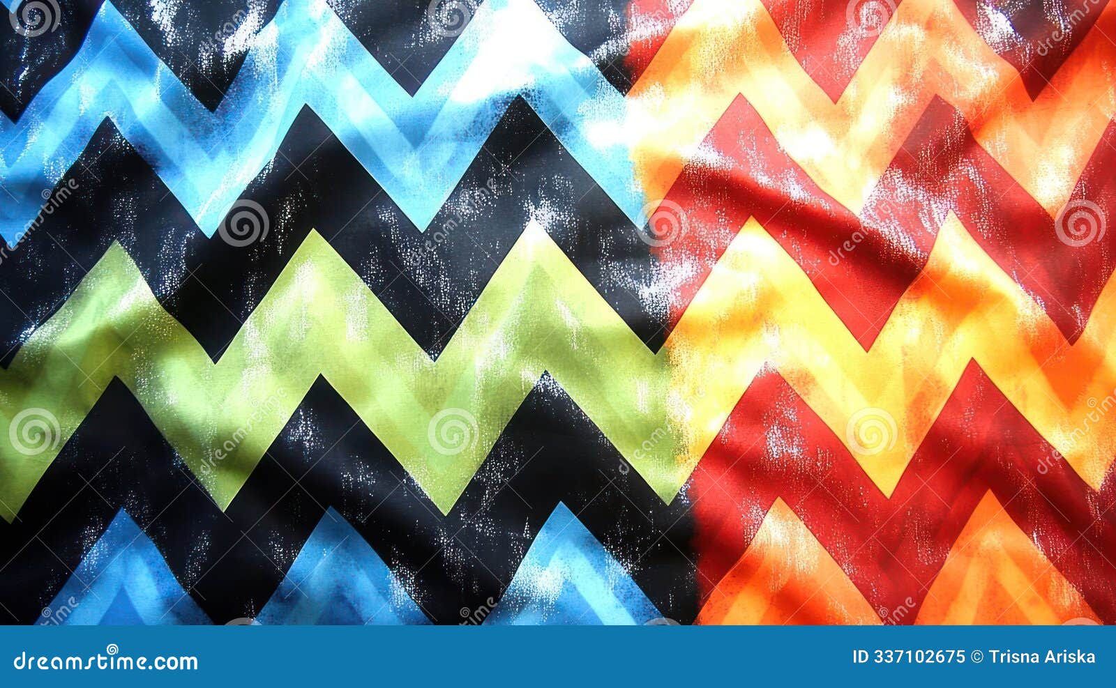 A Colorful Zigzag Pattern Featuring Various Vibrant Colors on a Fabric ...