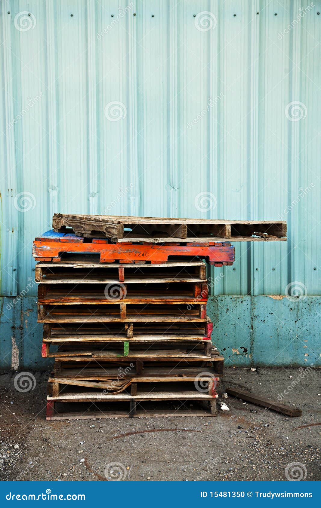 Colorfully Painted Wooden Pallets by a Blue Wall Stock Photo - Image of ...