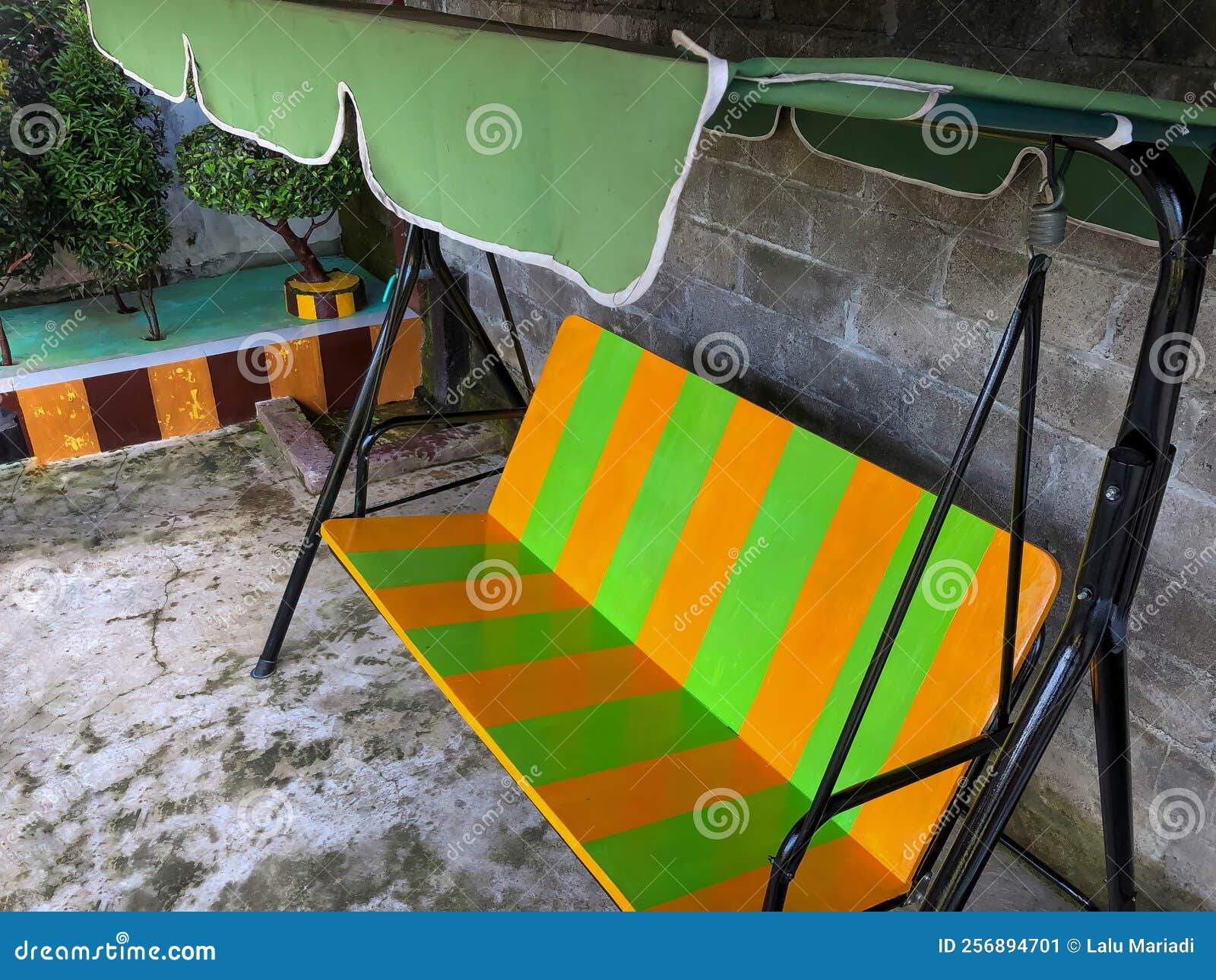 Colorfully Painted Wooden Swing Chairs Stock Image - Image of window ...