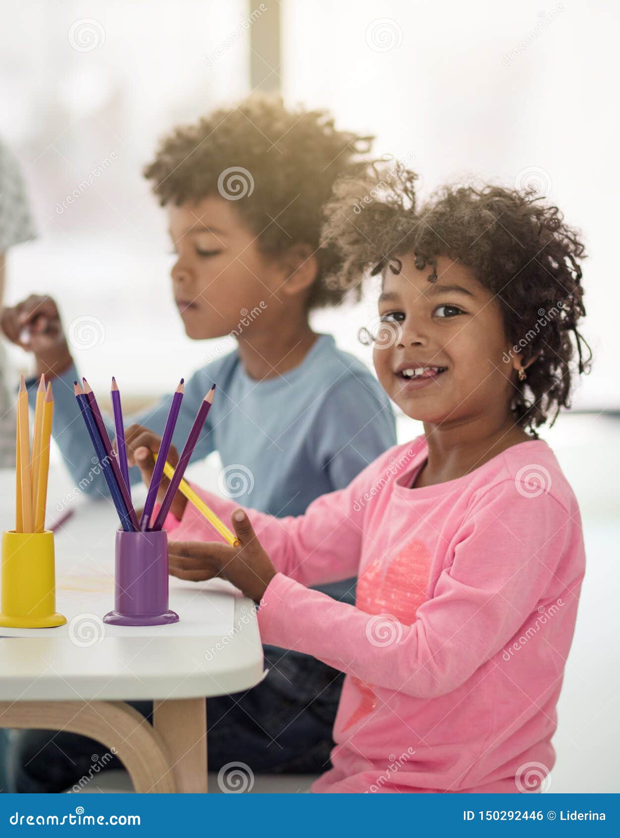 Coloring fun with brother stock photo. Image of bonding - 150292446
