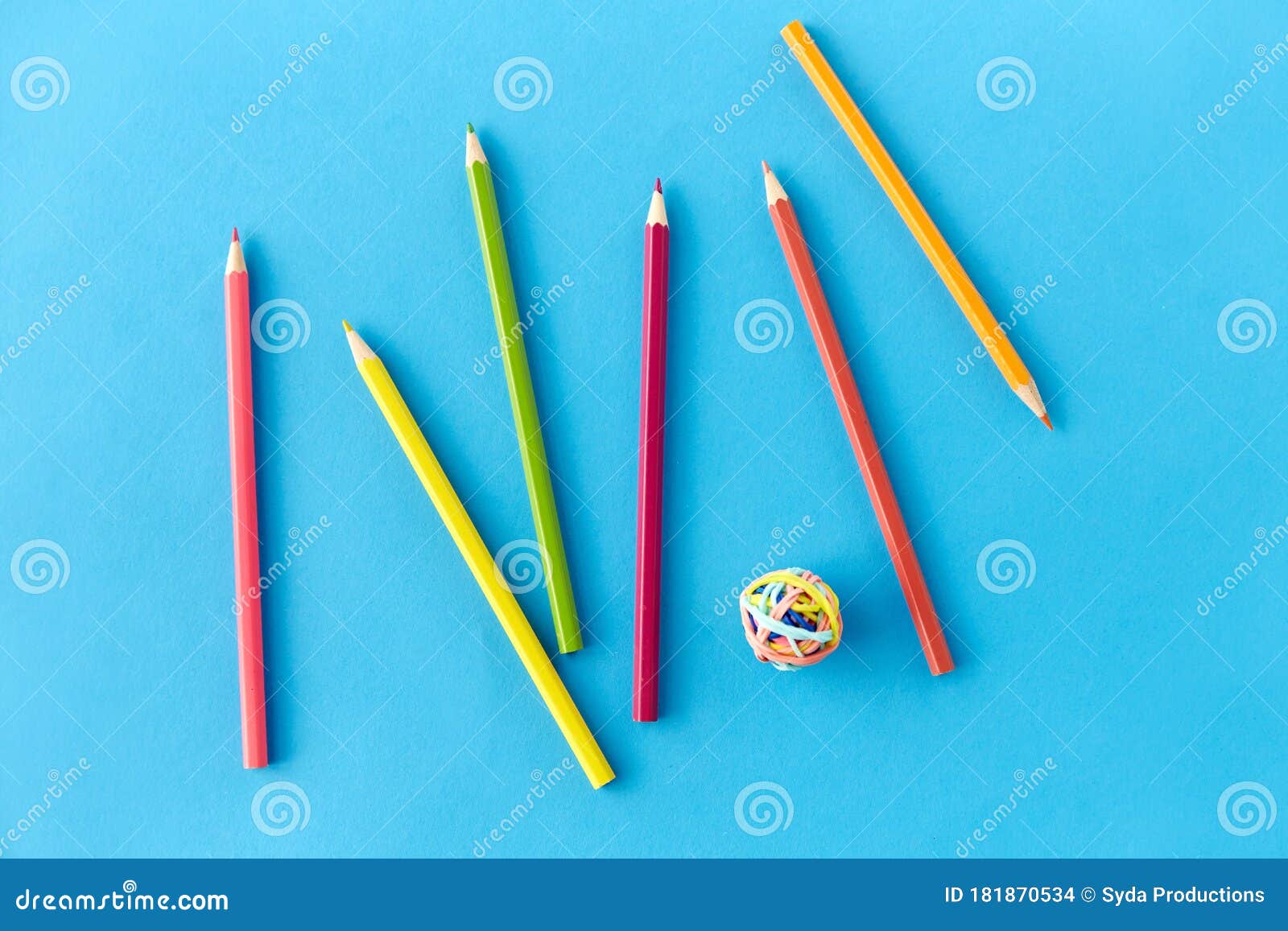 Coloring Pencils and Rubber Bands on Blue Stock Photo - Image of ...