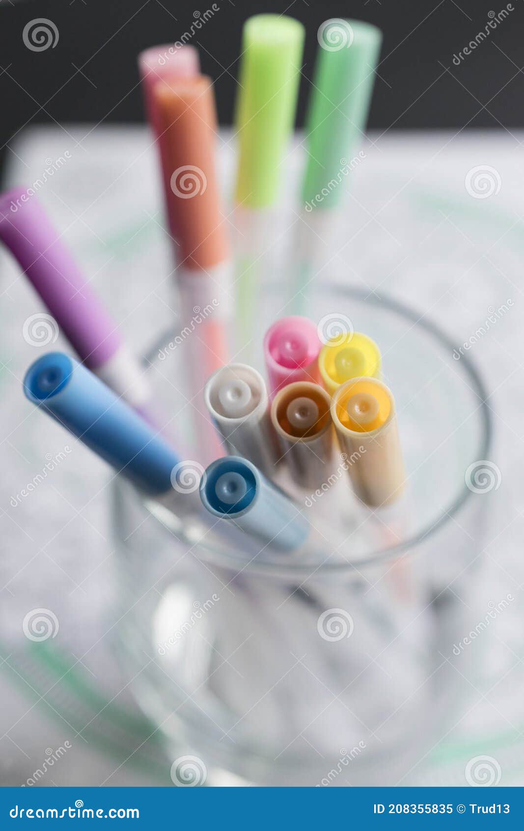 Coloring Pens in a Glass Pot with a Coloring Book Stock Image - Image ...