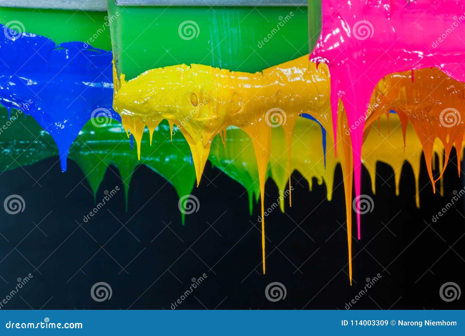 Colors Dripping from the Rubber Print Handle Stock Image - Image of ...