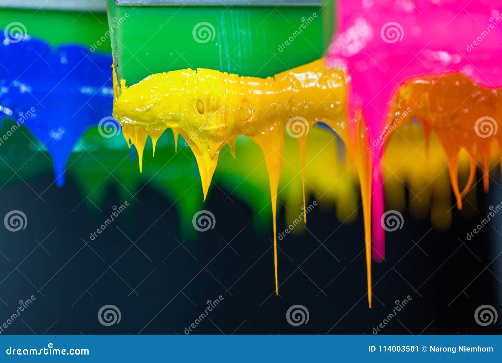 Colors Dripping from the Rubber Print Handle Stock Image - Image of ...