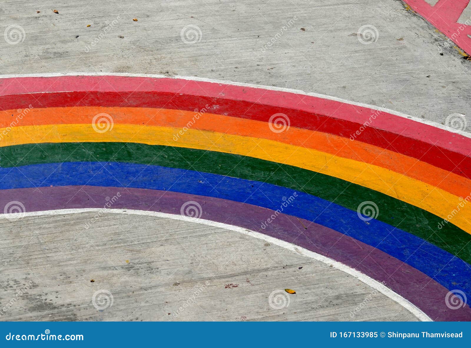 Painting Multi-colored Rainbow on the Floor. Colors of Rainbow Stock ...