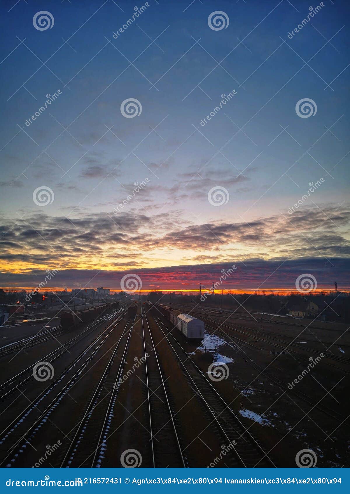 Colors of train station stock image. Image of sunrise - 216572431