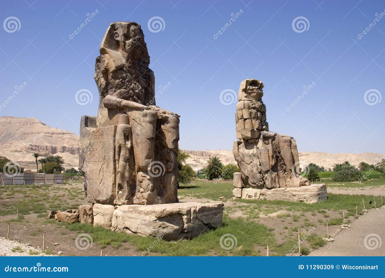 Colossi Of Memnon Are Two Massive Stone Statues Pharaoh Amenhotep III ...