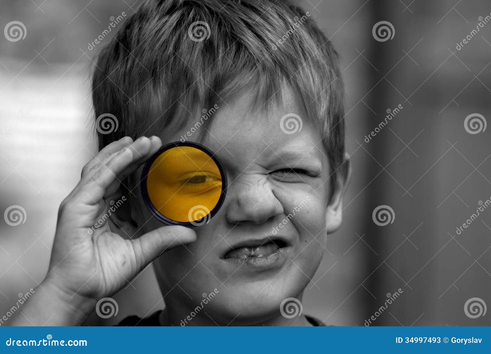 Boy Looking through Yellow Filter Stock Image - Image of yellow, thumb ...