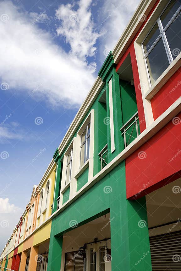 Colour homes above shops stock image. Image of colours - 3943805
