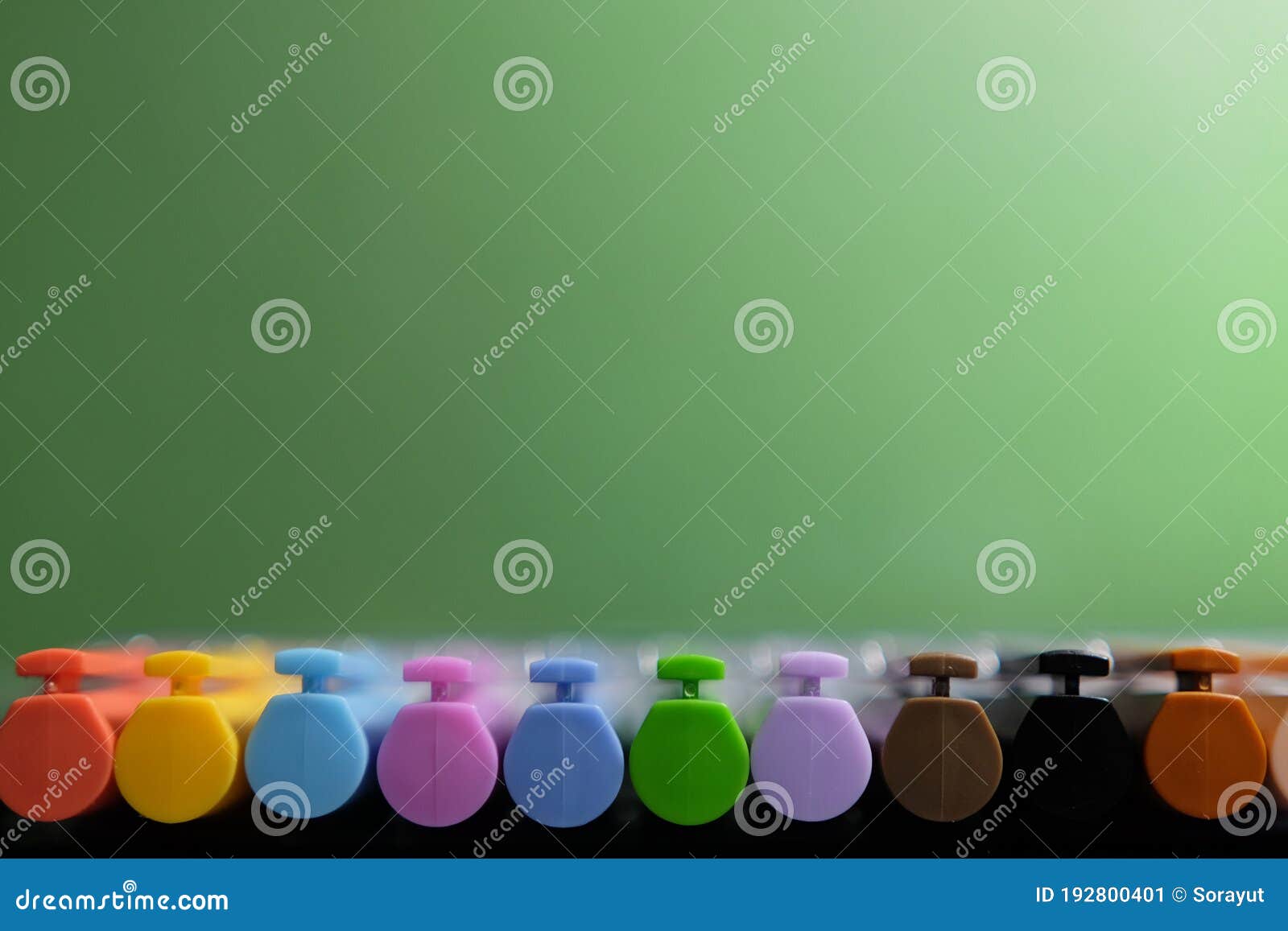 Colour Pens Lined Up Isolated on Green Background Stock Image - Image ...