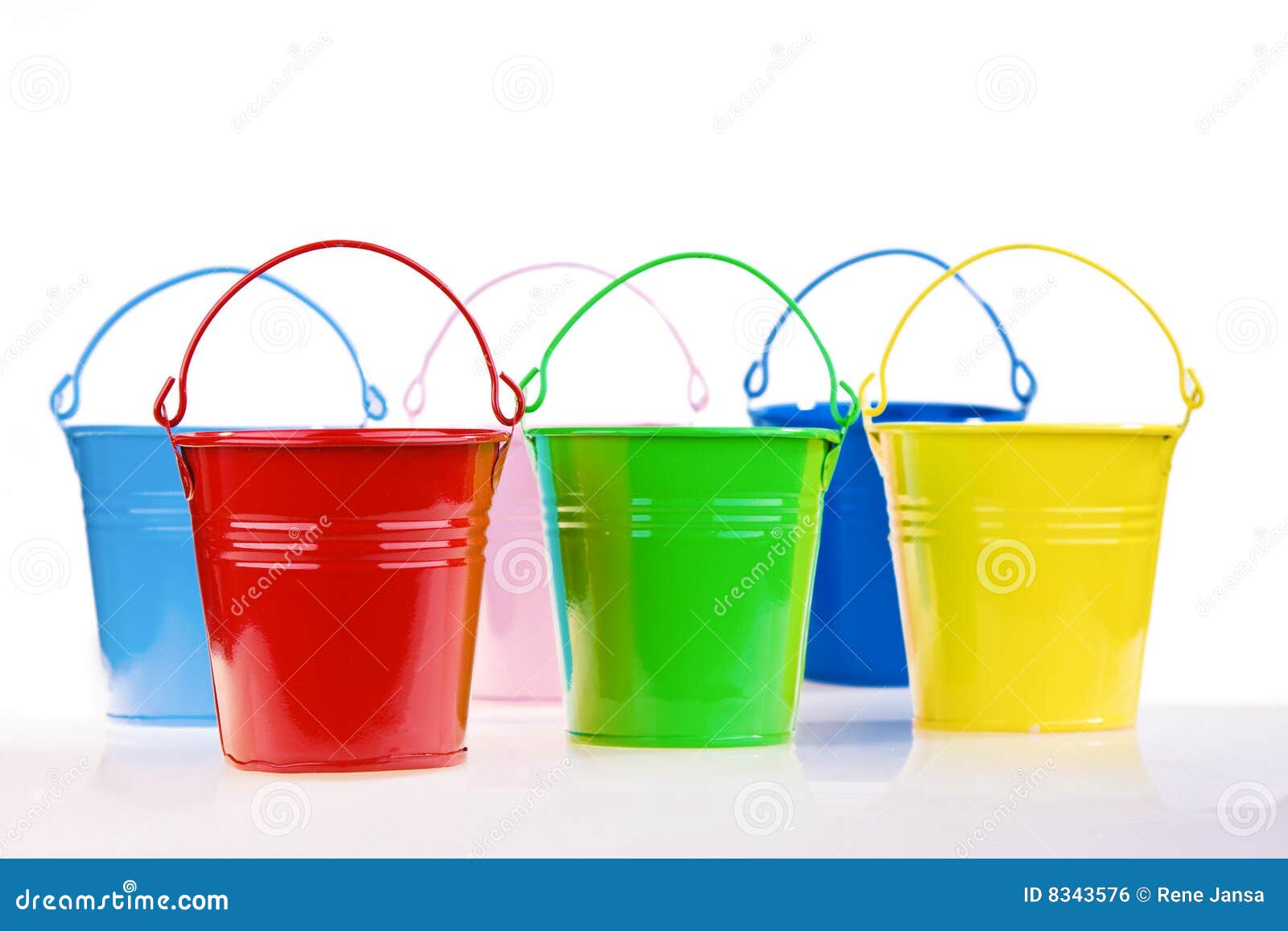 Coloured Buckets And Watering Can On The Floor Stock Image ...