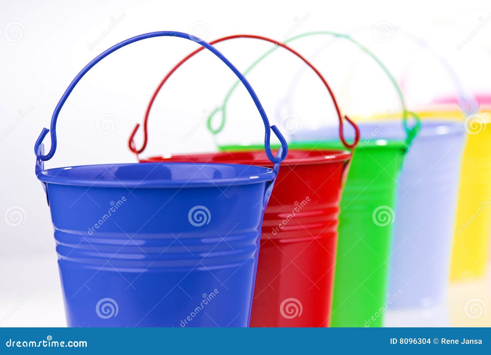 Coloured buckets in line stock photo. Image of diagonal - 8096304