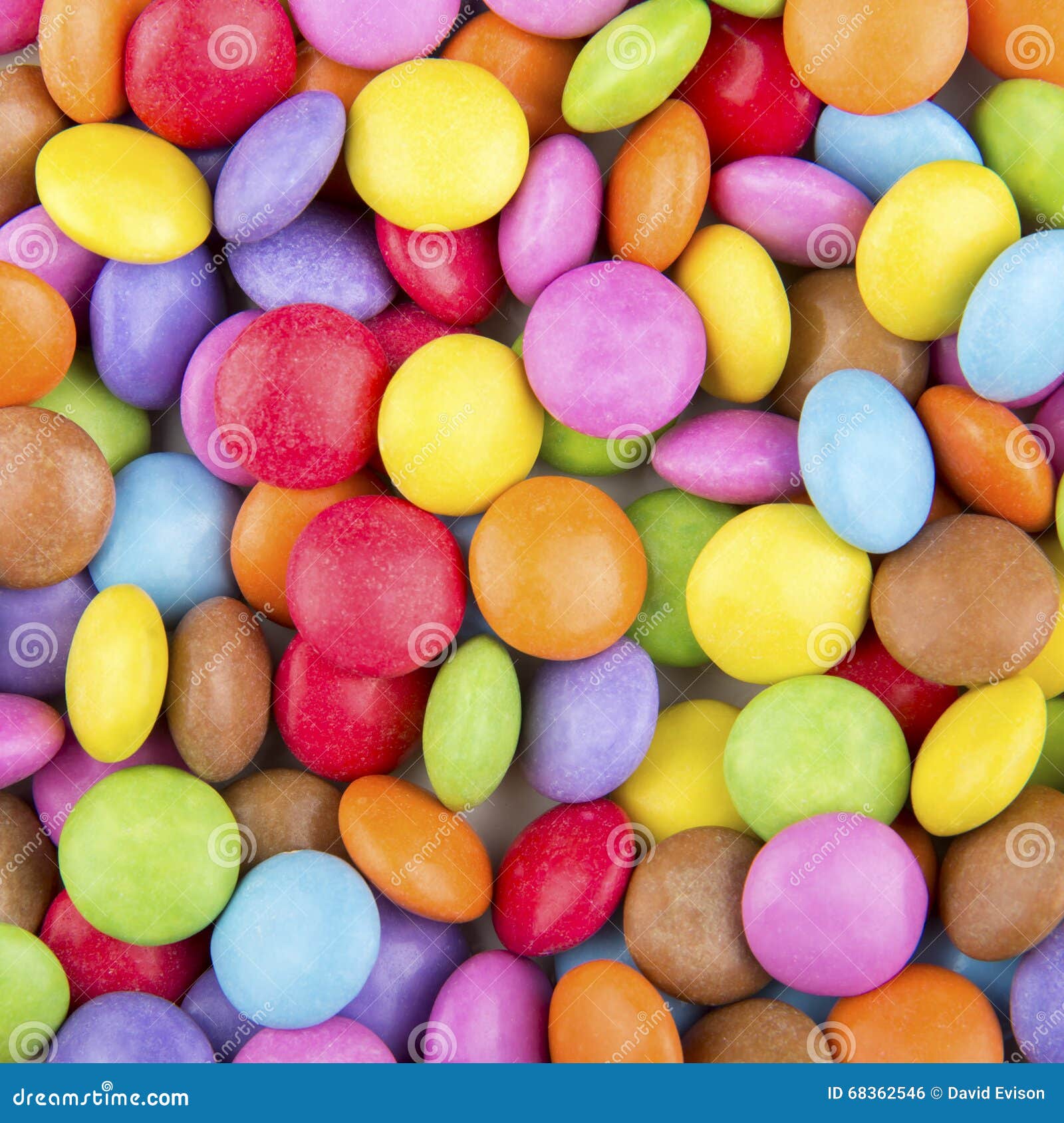 Coloured chocolate sweets stock photo. Image of brown - 68362546