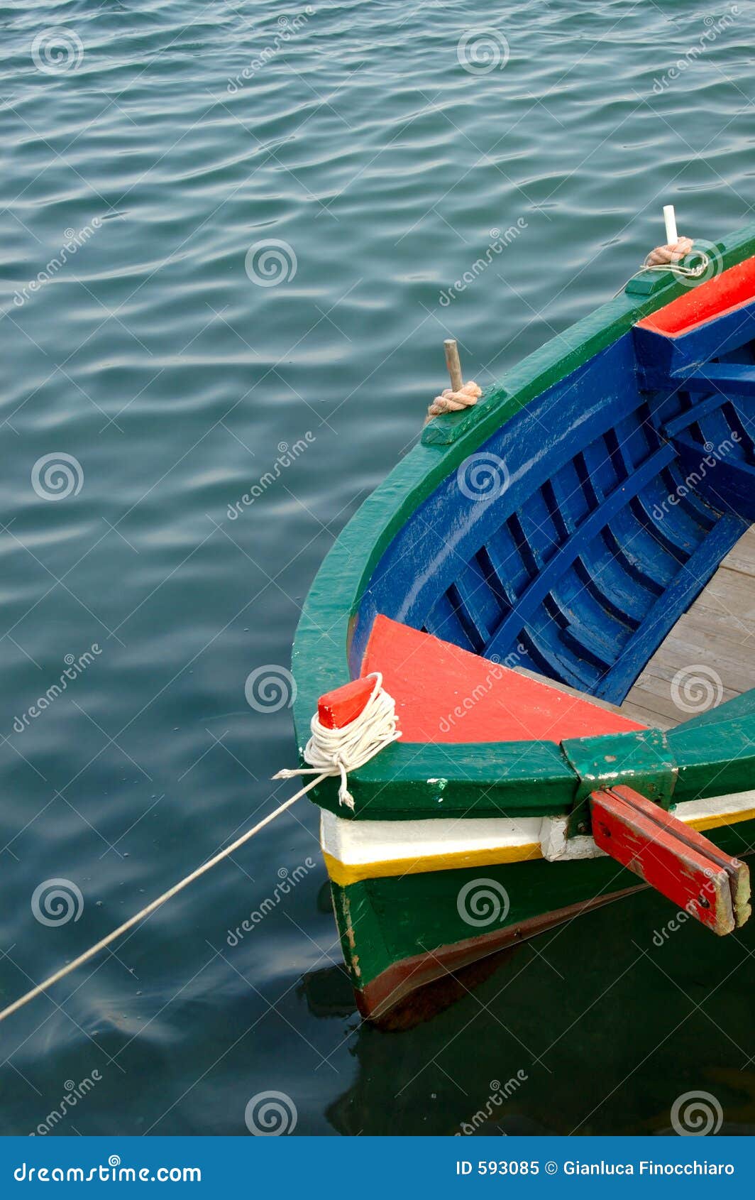 A coloured fishing boat stock image. Image of stripes, boats - 593085