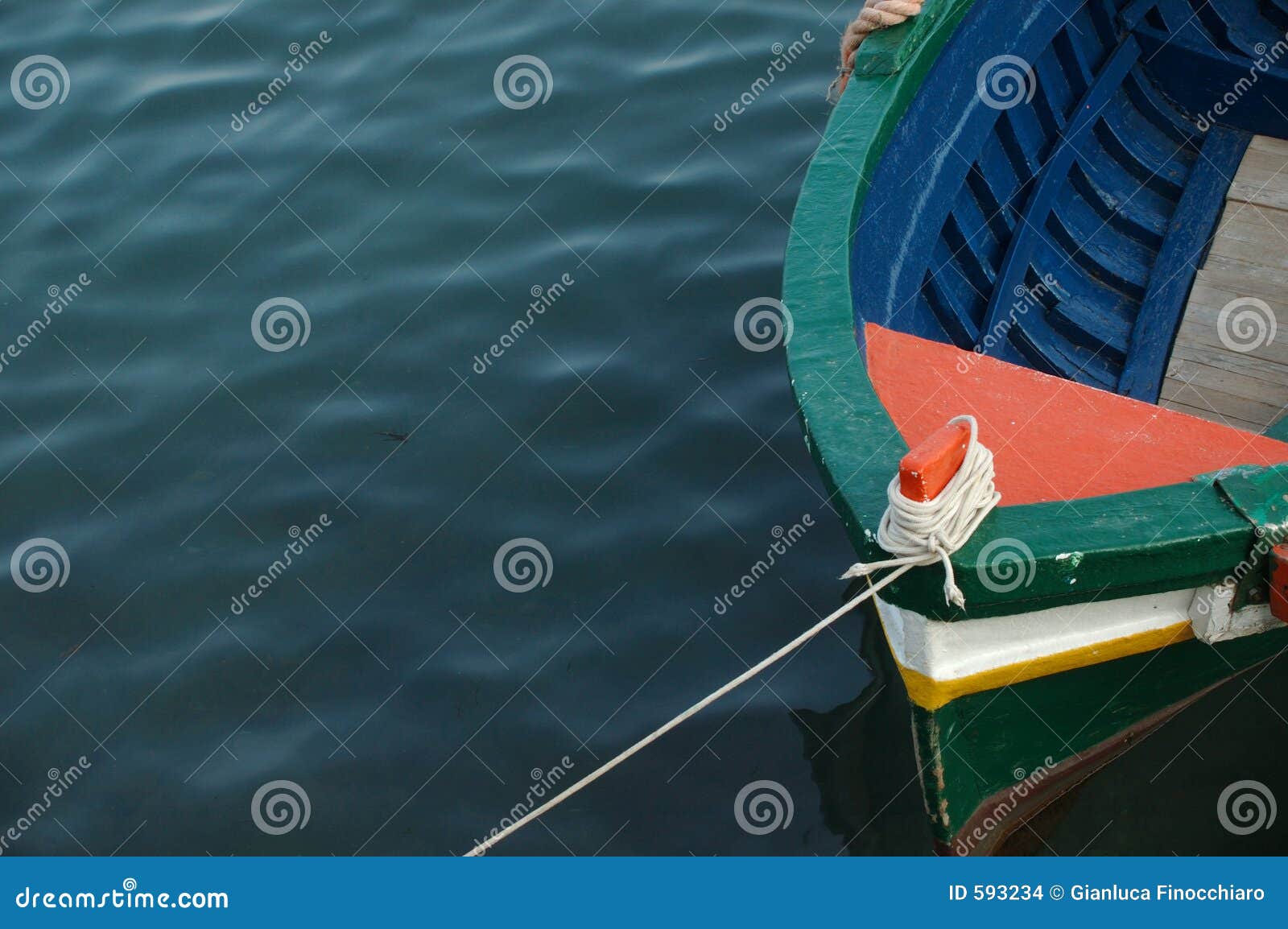 A coloured fishing boat stock photo. Image of ship, water - 593234