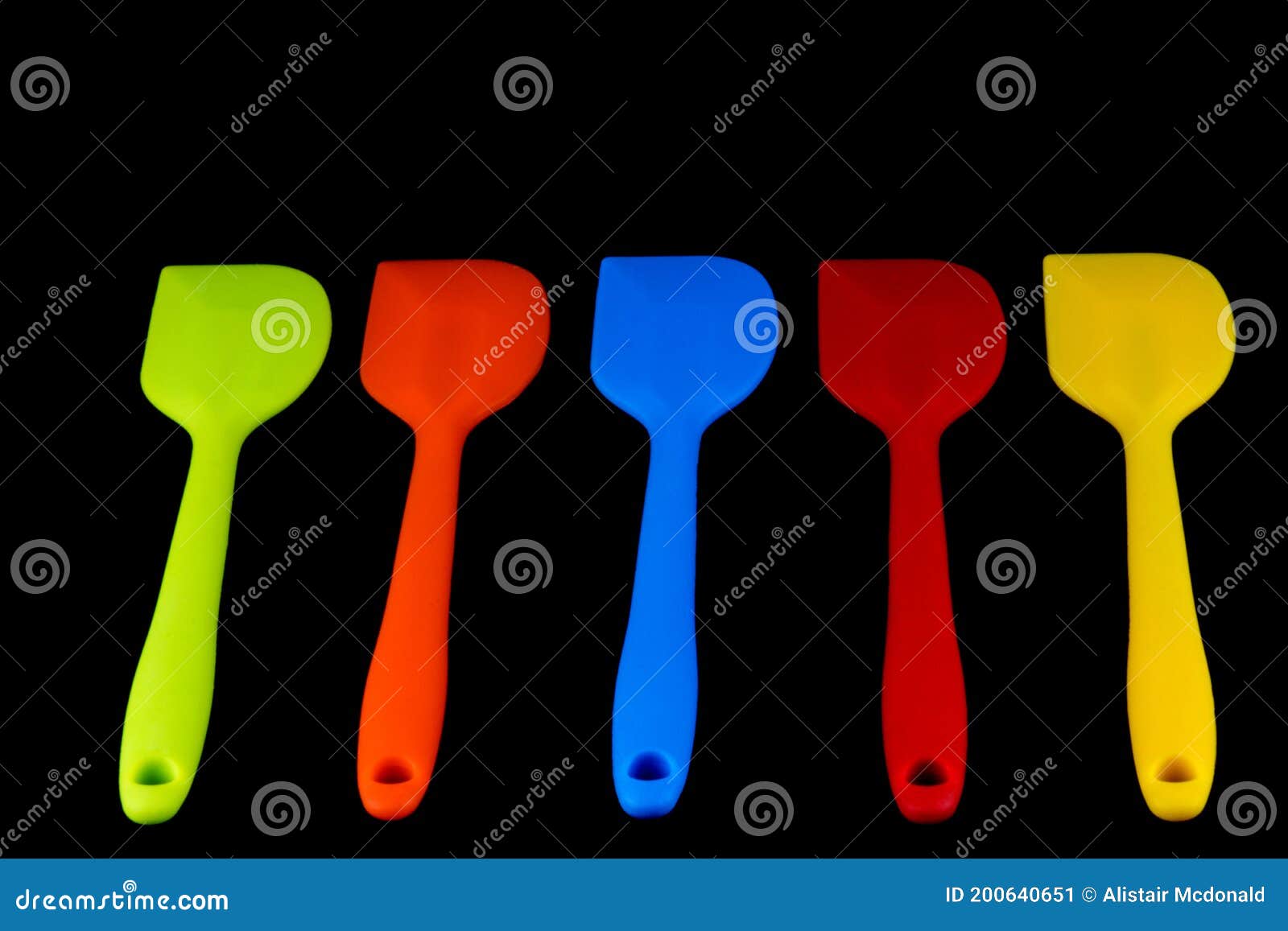 Coloured Kitchen Spatulas on a Black Background Stock Image - Image of ...