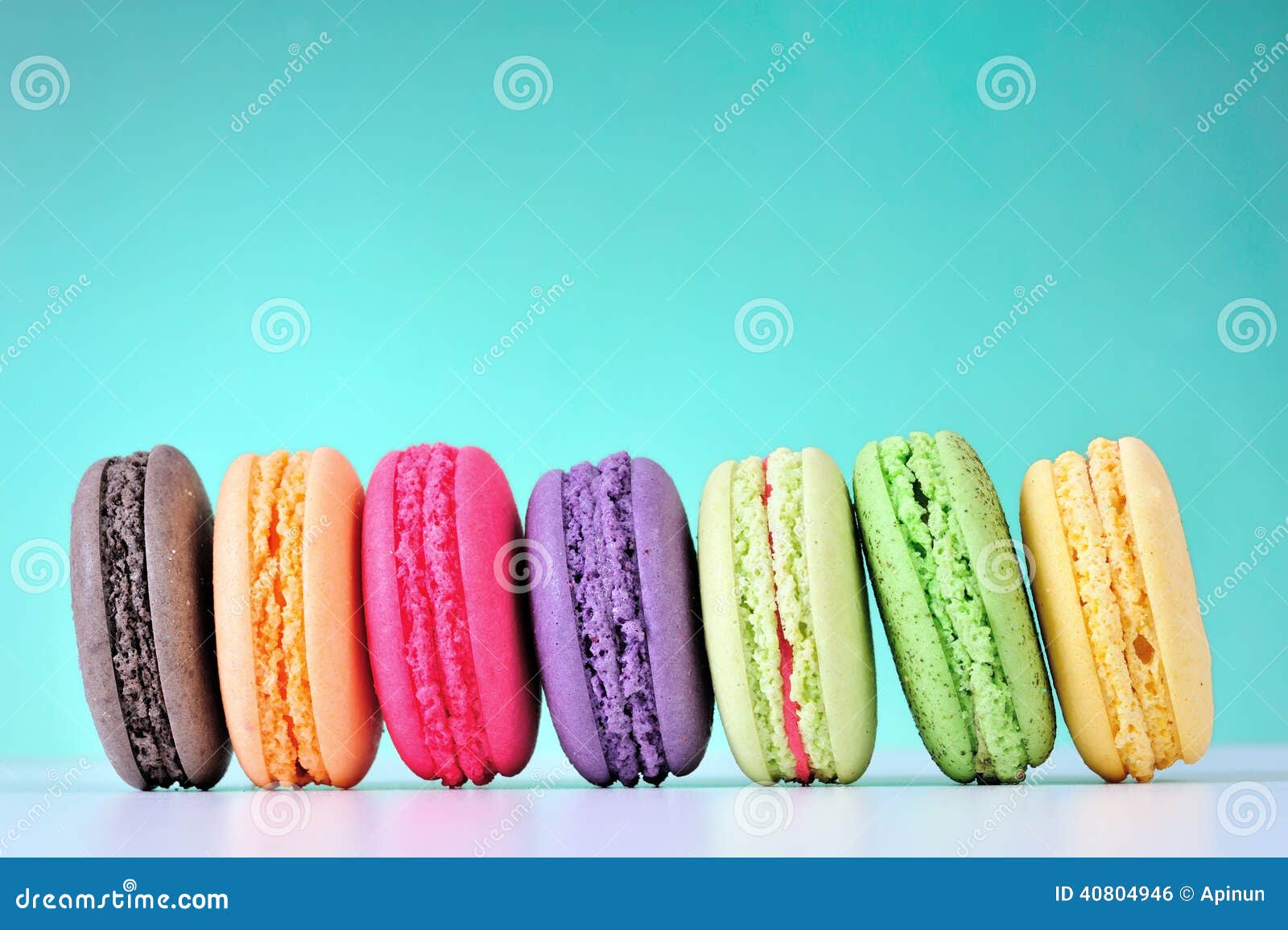 Coloured Macaroons on a Green Background Stock Photo - Image of ...