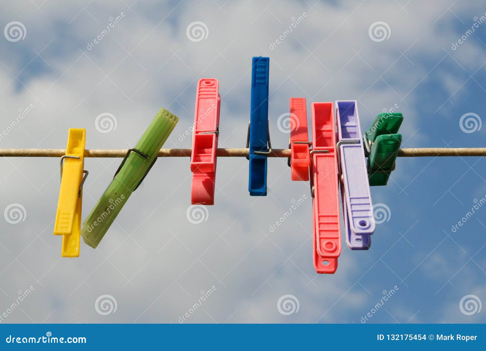 Coloured Pegs on a Washing Line with Sky Stock Photo - Image of washing ...