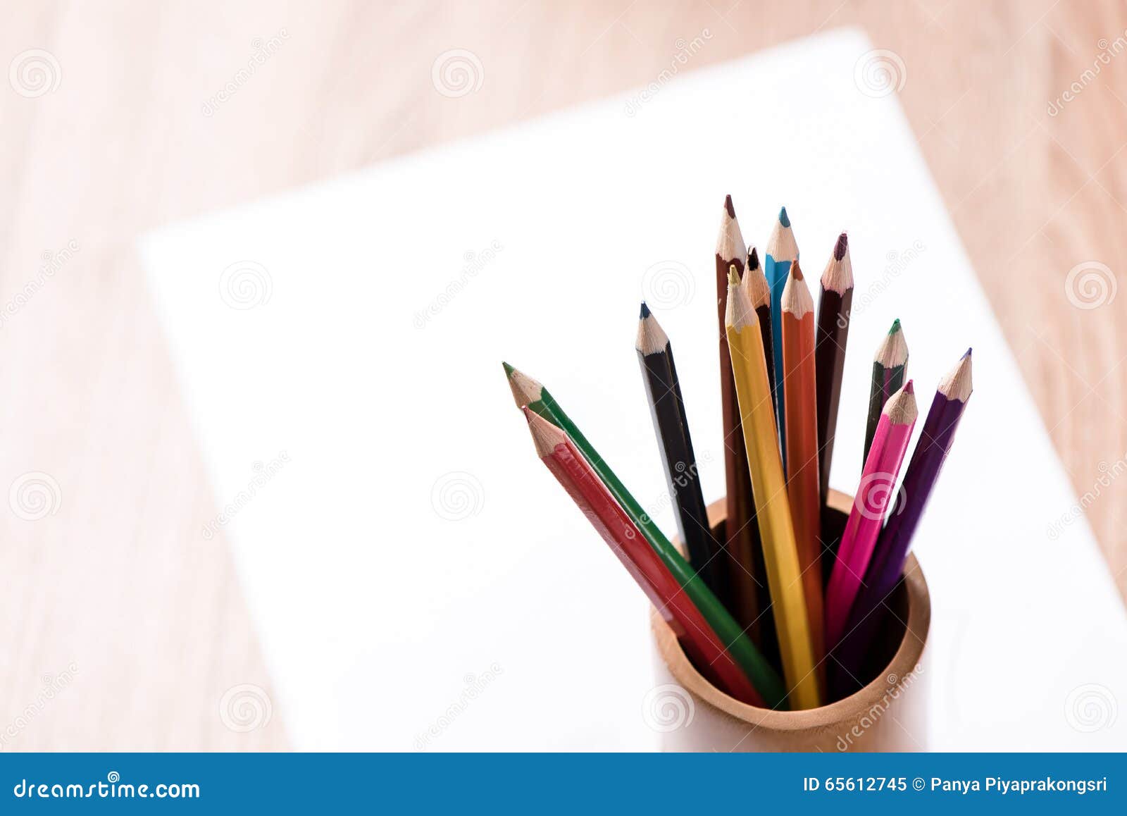 Coloured Pencil and Paper Note on Wood Table Stock Image - Image of ...