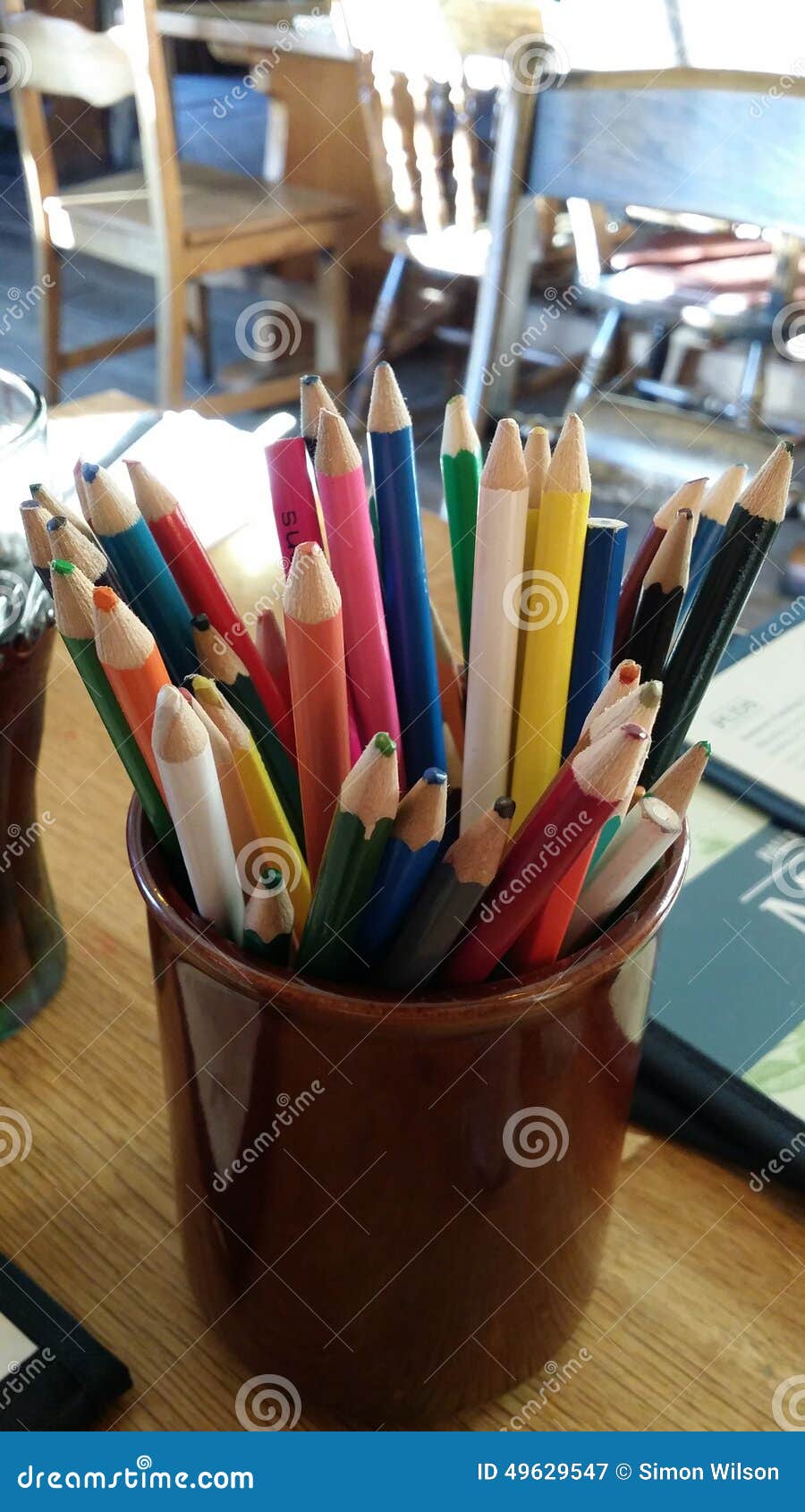 Coloured pencils in a pot stock image. Image of lots - 49629547