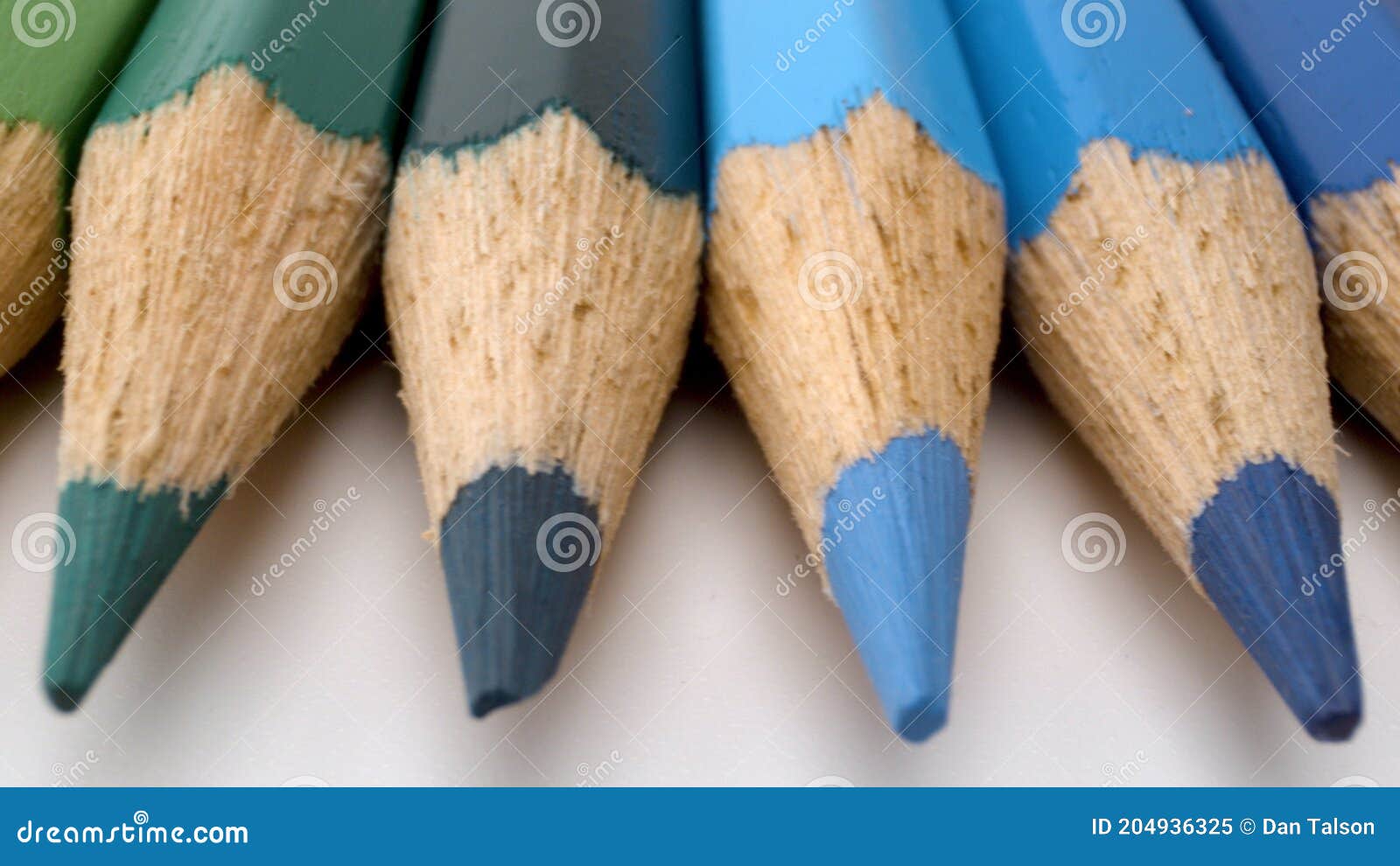 Coloured pencils in a row stock image. Image of sharp - 204936325