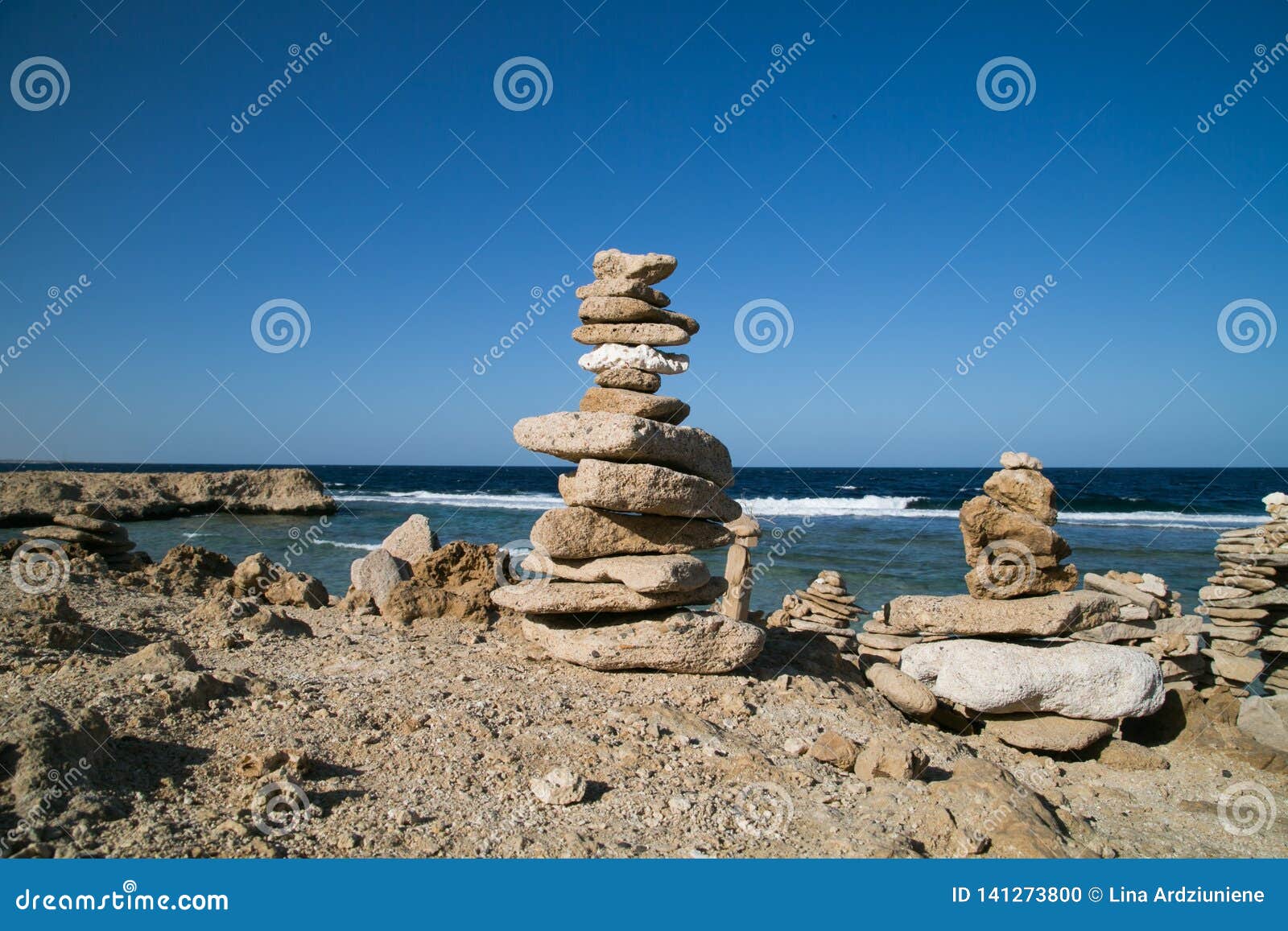 Coloured Rock Cairns by the Red Sea Stock Illustration - Illustration ...