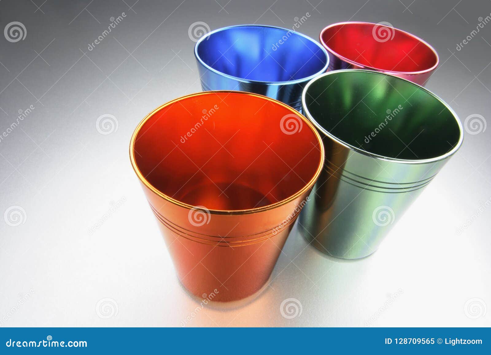 Coloured Tin Cups stock image. Image of color, life - 128709565