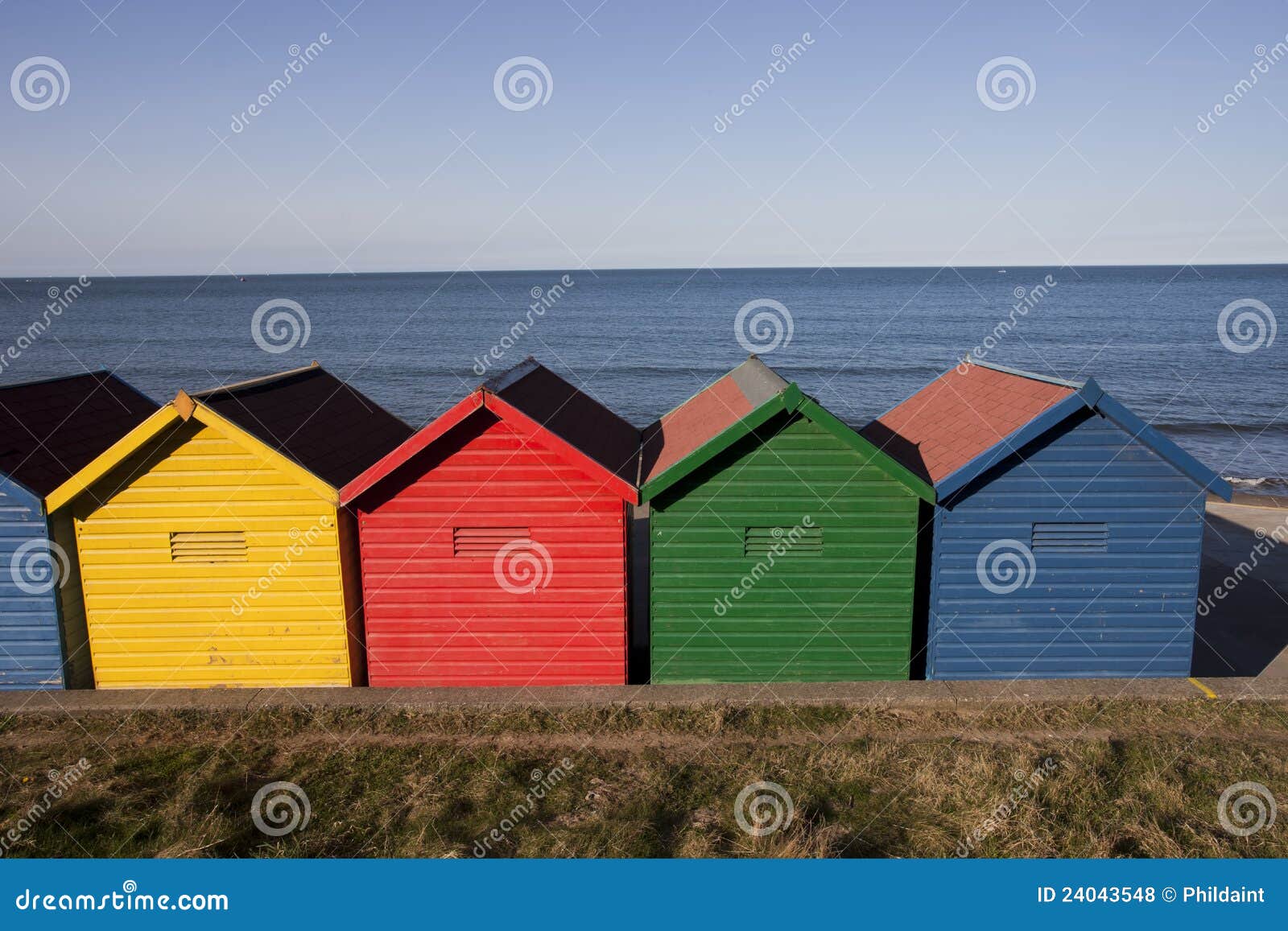 Colourful beach huts stock photo. Image of sunny, sand - 24043548