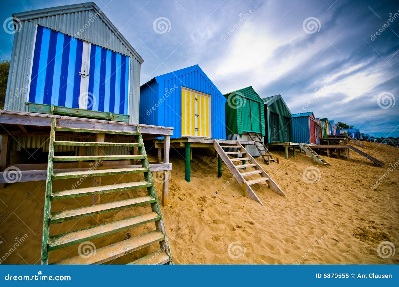 Colourful Beach Huts with Dramatic Sky Stock Photo - Image of sand ...