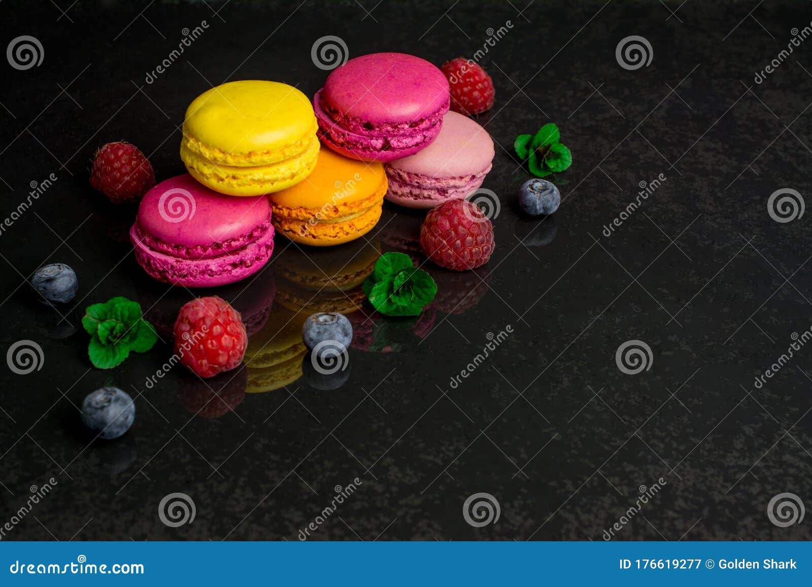Colourful Biscuits Macaroon and Blueberry Raspberry Fresh Mint on Black ...
