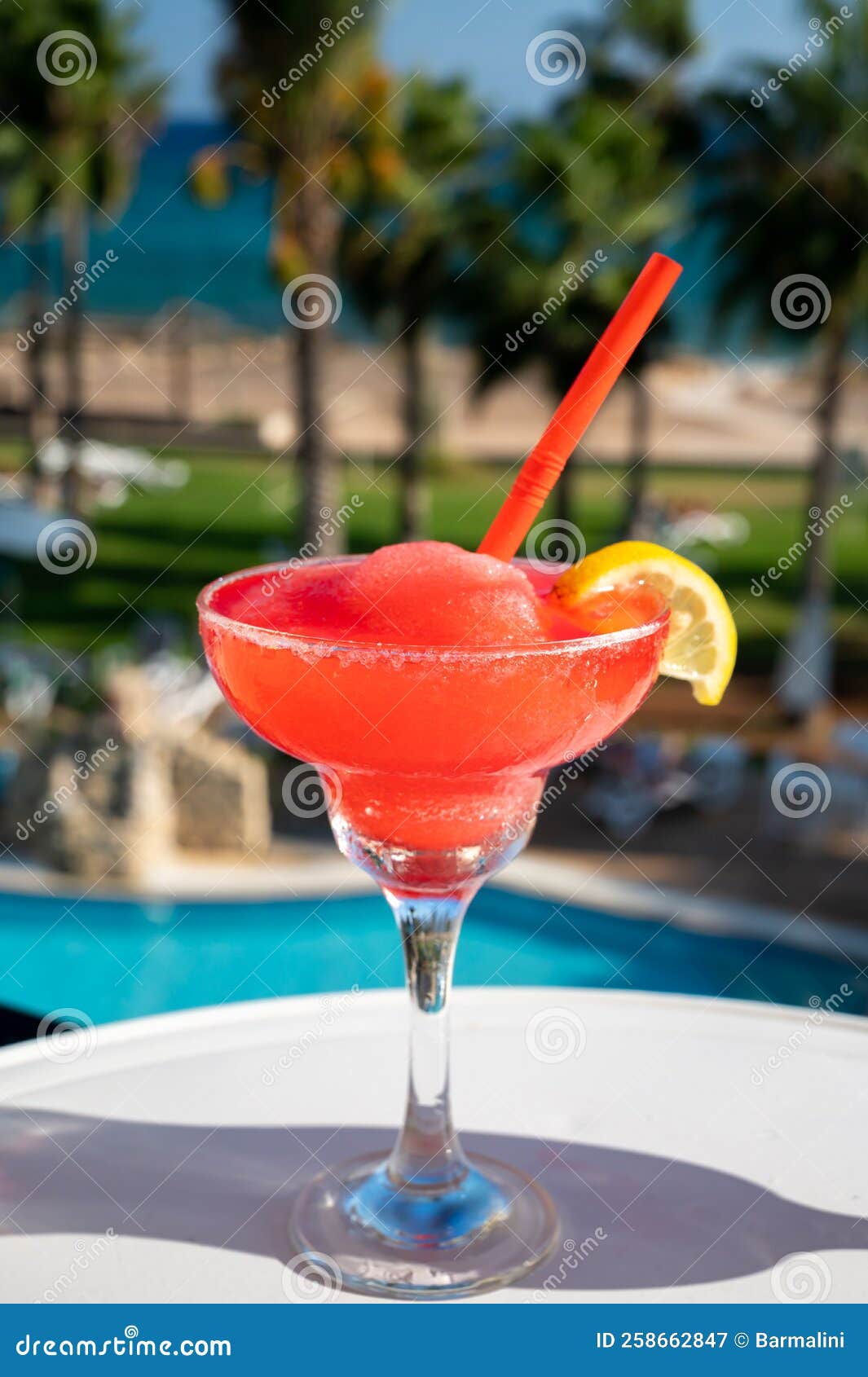 Colourful Cold Strawberry Daiquiri Cocktail Drink Served In Glass At