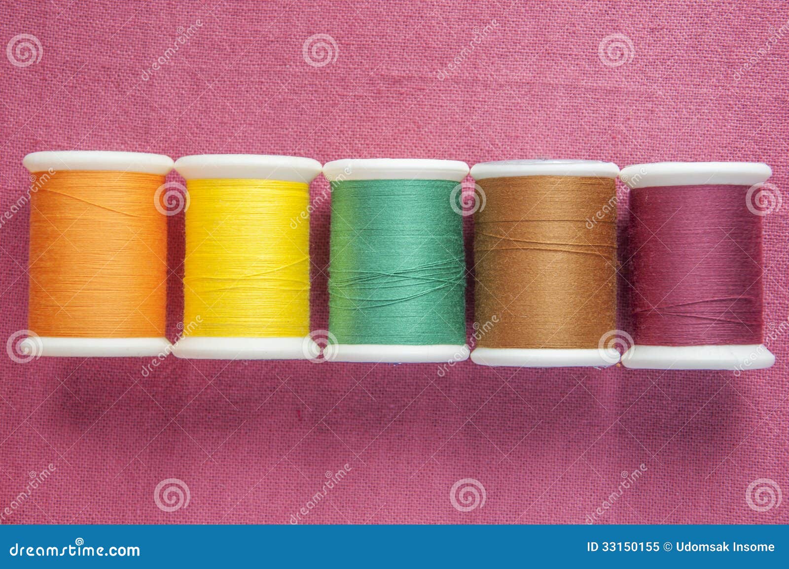 Colourful Cotton Reel on Cotton Textile Stock Image - Image of object ...