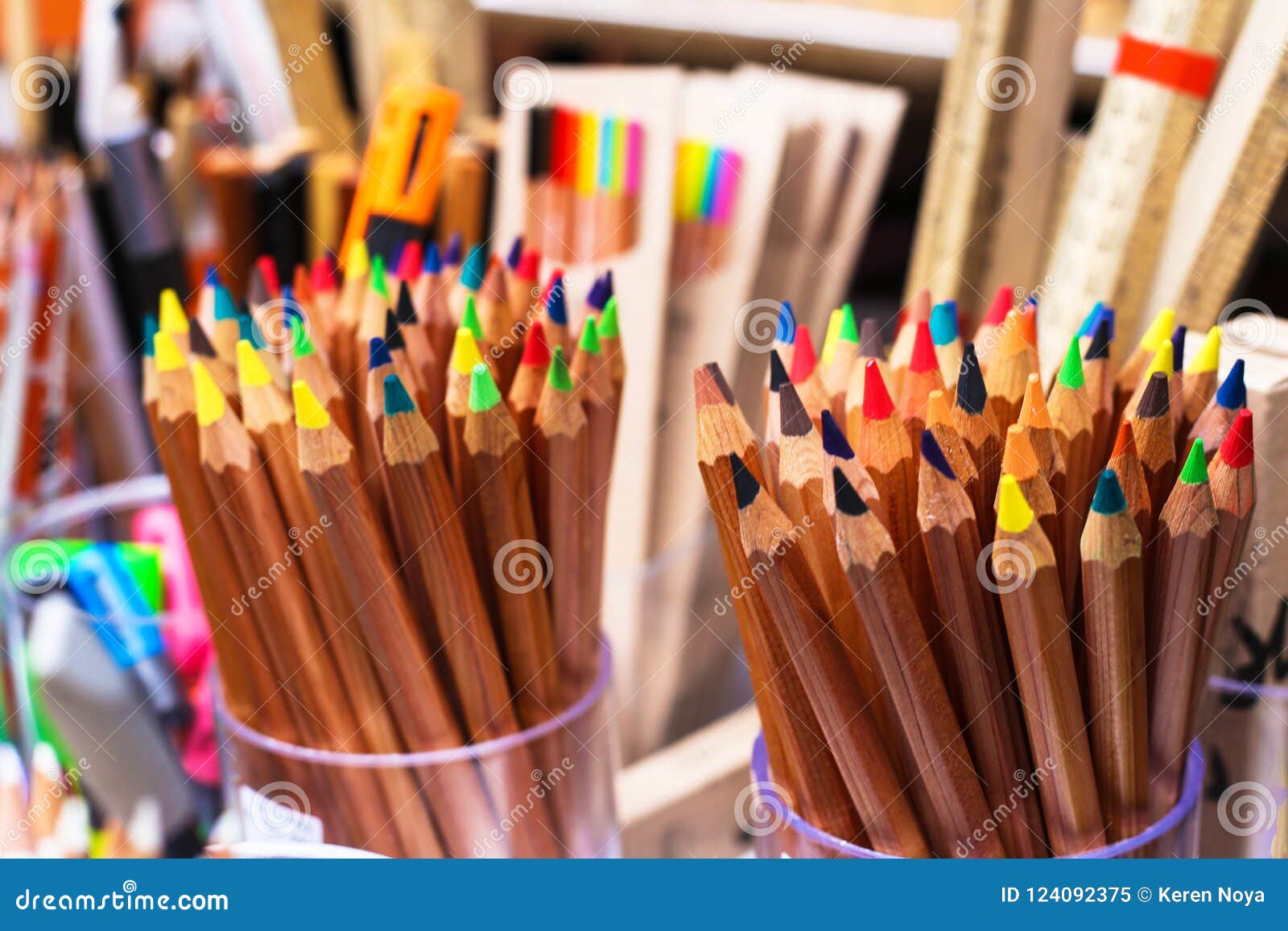 Colourful Crayons Placed into Cups on the Student`s Table Stock Image ...